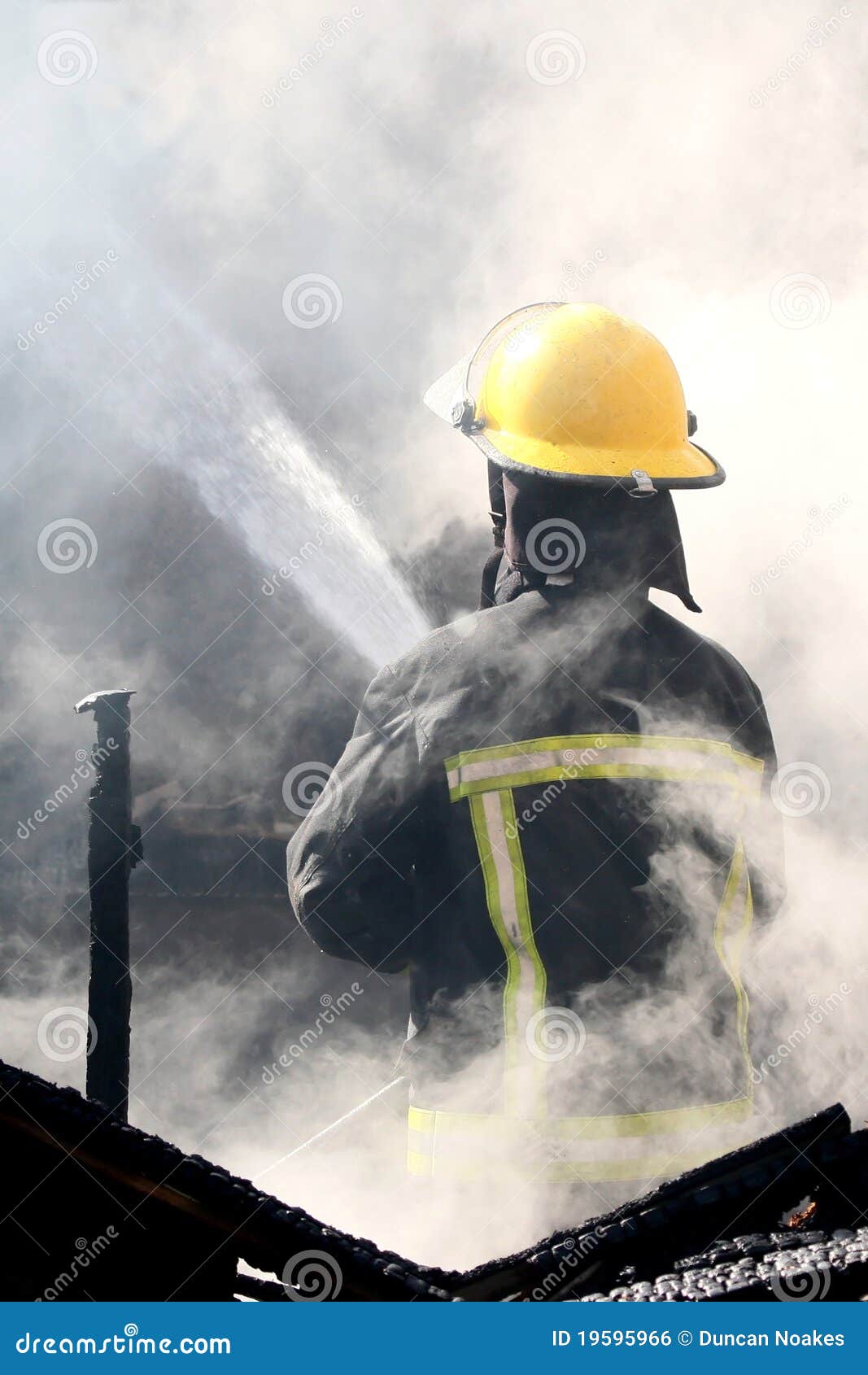Fireman Putting Out a House Fire Stock Photo - Image of heat ...