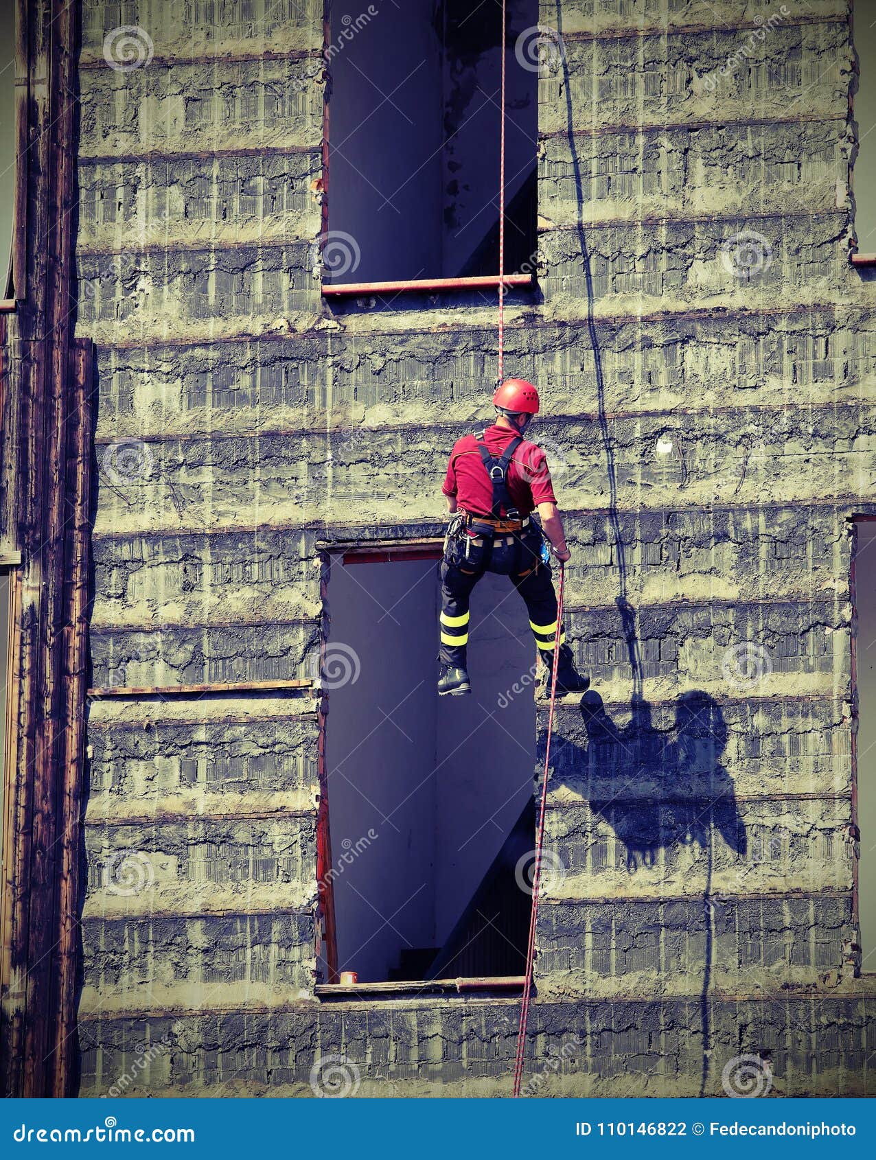 Climber Fireman Rappelling the Wall with Vintage Effect Stock Photo ...