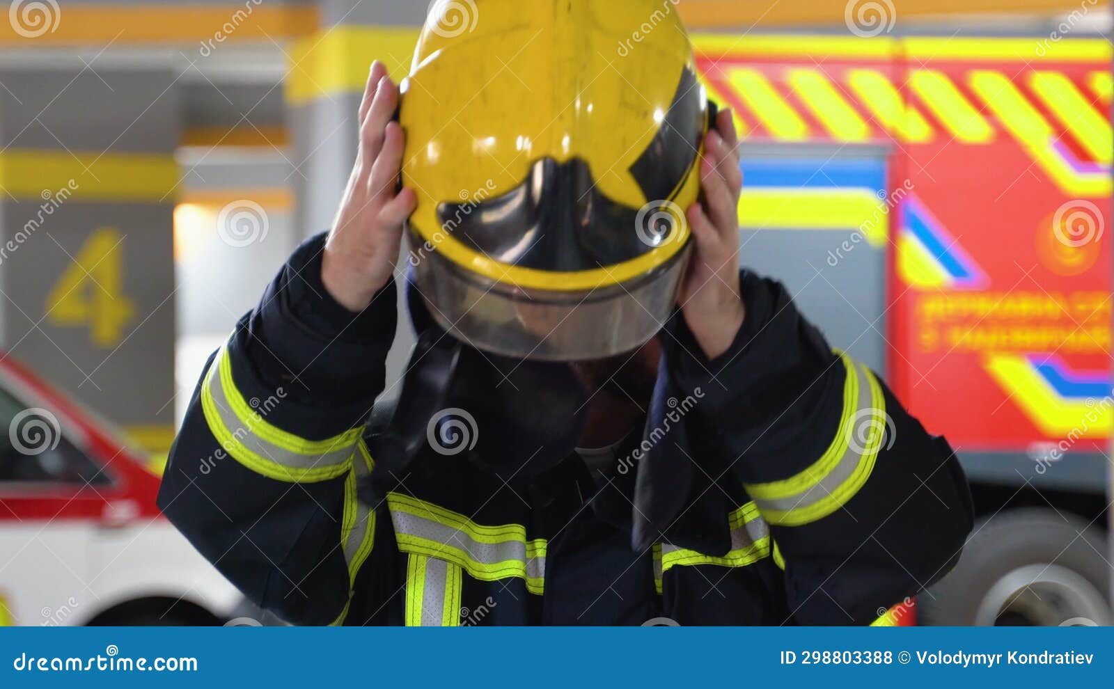 Fireman Removes the Protective Helmet at the Fire Station Stock Footage ...