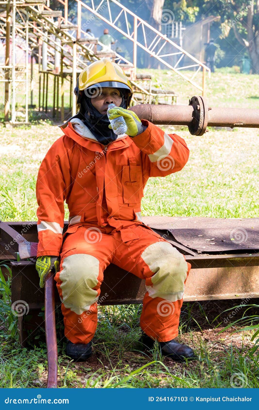 Fireman Rest and Drinking Water in Work Site. Stock Image - Image of ...
