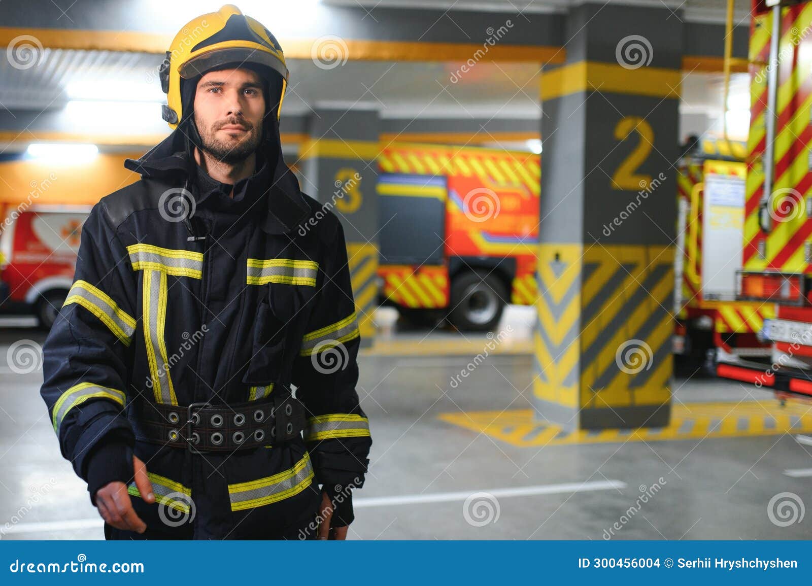 Fireman Sitting on Bench at Fire Station Stock Photo - Image of young ...