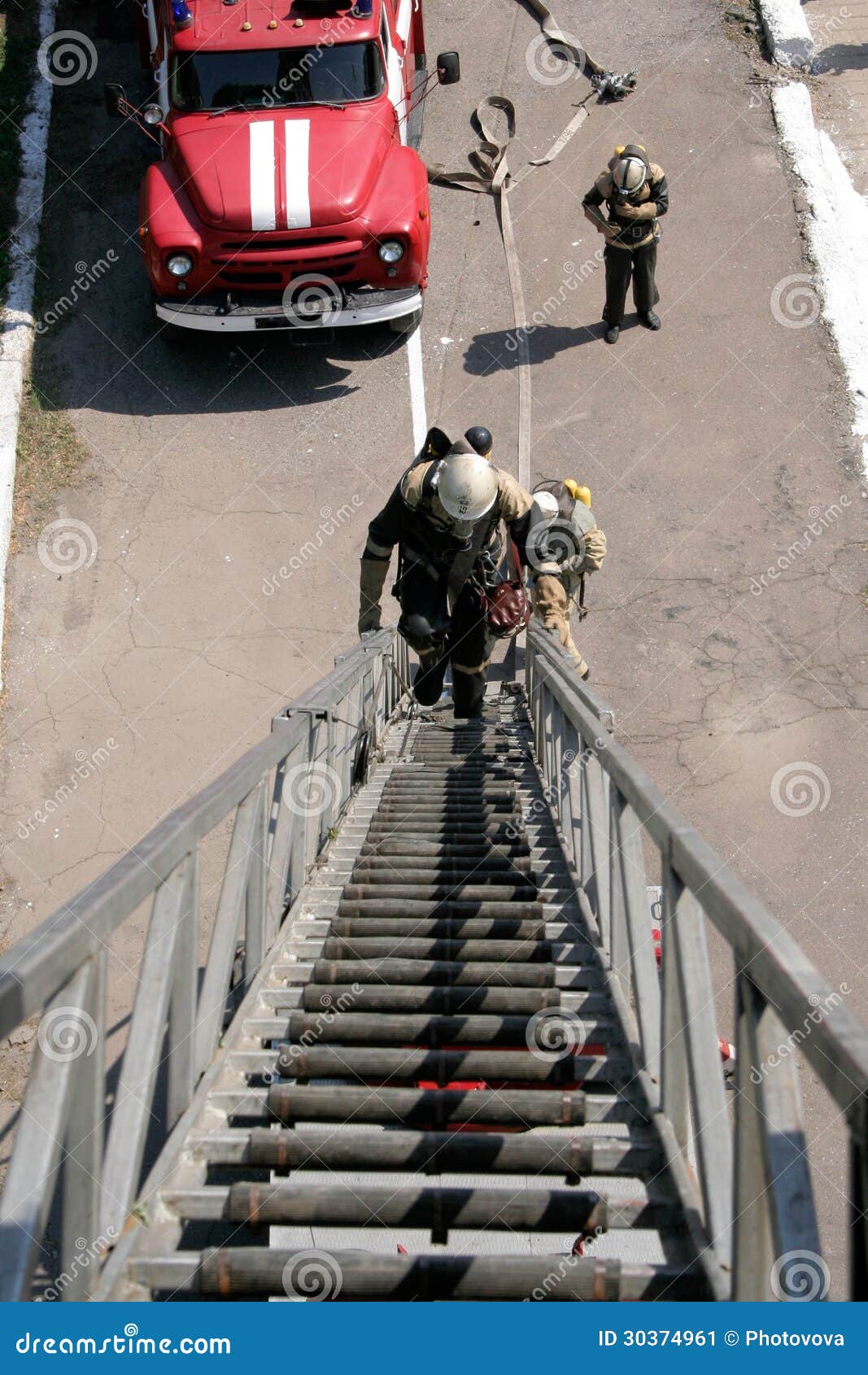 Fireman on the stairs stock image. Image of hose, burning - 30374961