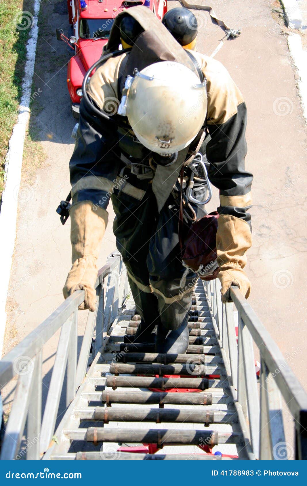 Fireman on the stairs editorial stock photo. Image of effort - 41788983