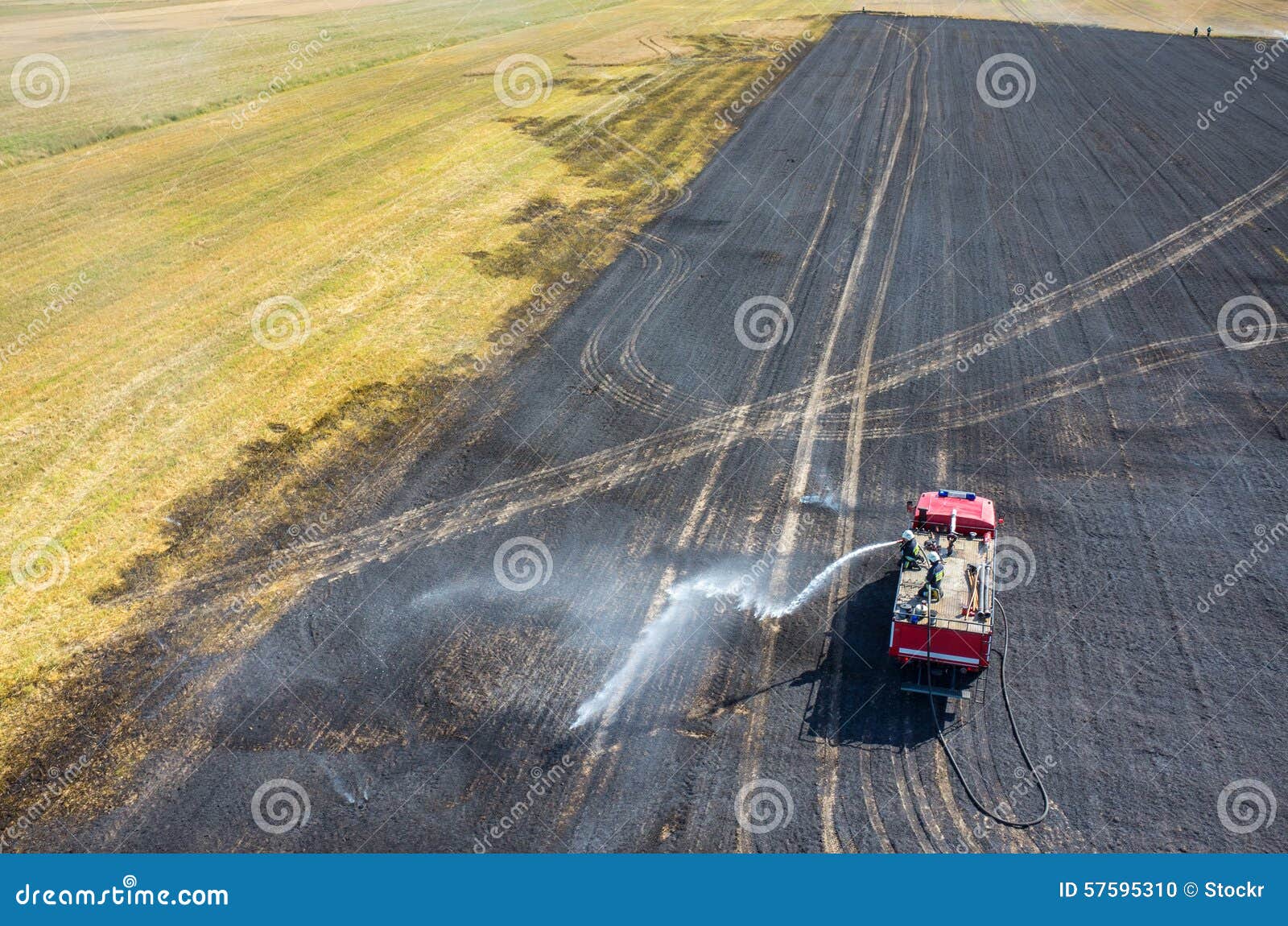 Fireman Truck Working on the Field on Fire Stock Photo - Image of help ...
