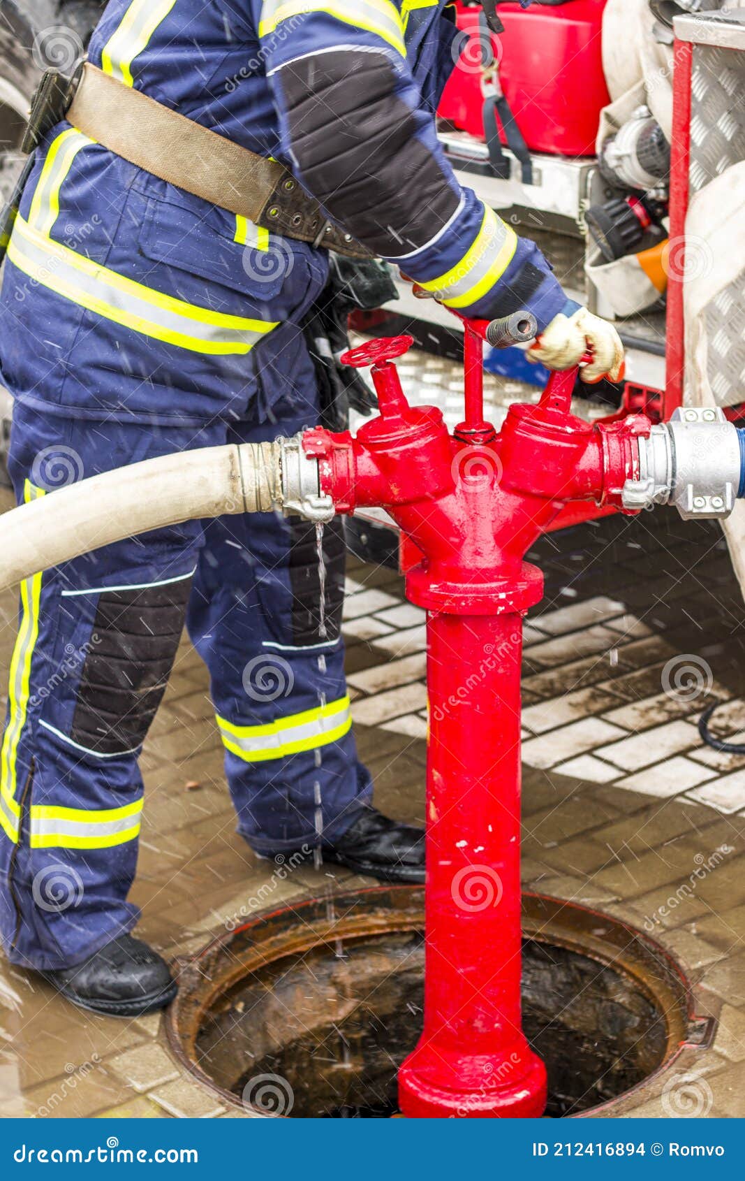 Fireman Turns Taps on the Hydrant Stock Photo - Image of protective ...