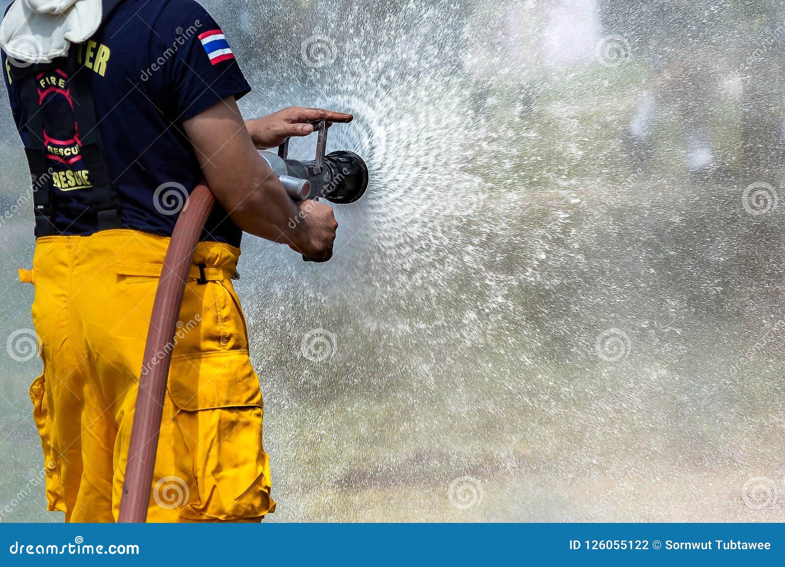 Fireman Using Water and Extinguisher,fireman Using Water and ...