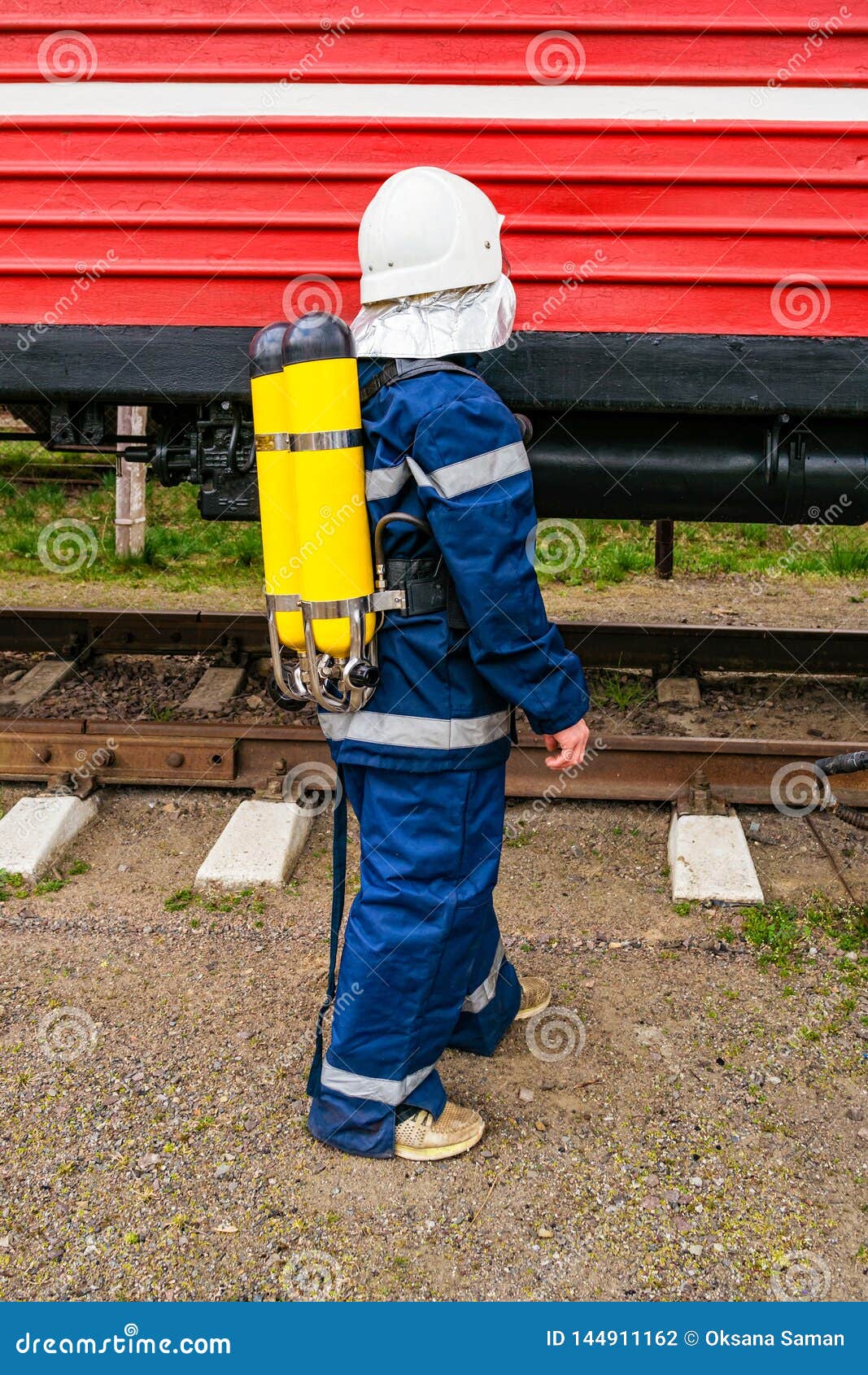 Fireman Wearing Protective Uniform Standing Next To a Fire Train Stock ...