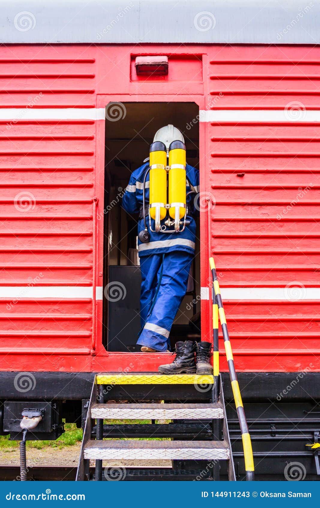 Fireman Wearing Protective Uniform Standing Next To a Fire Train Stock ...