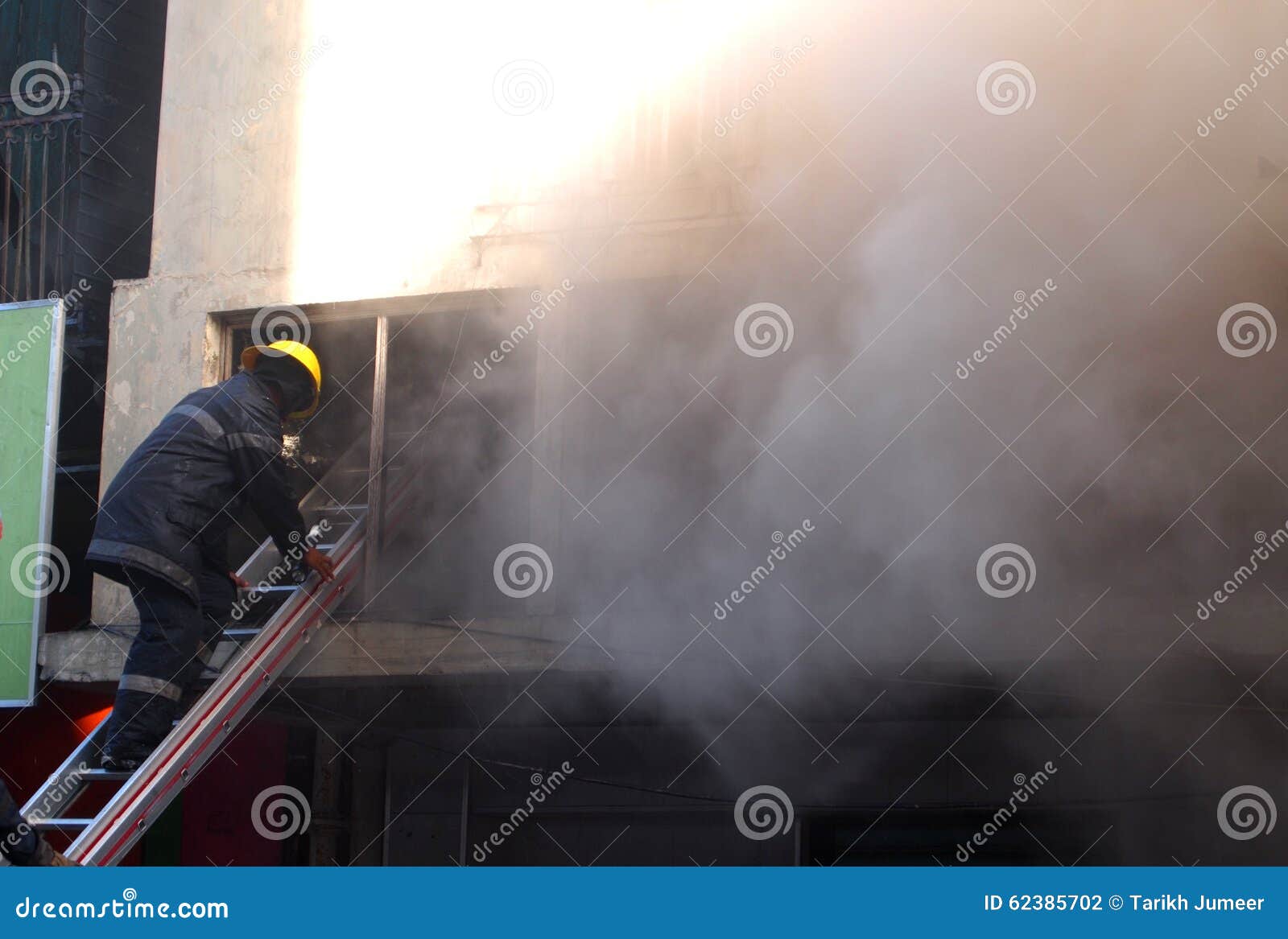 Fireman at work editorial photography. Image of ladder - 62385702