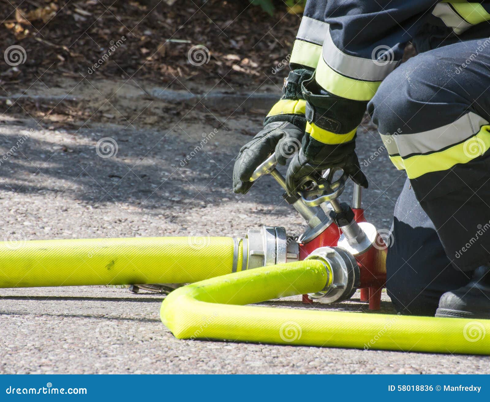 Fireman at work stock photo. Image of valve, firefighters - 58018836