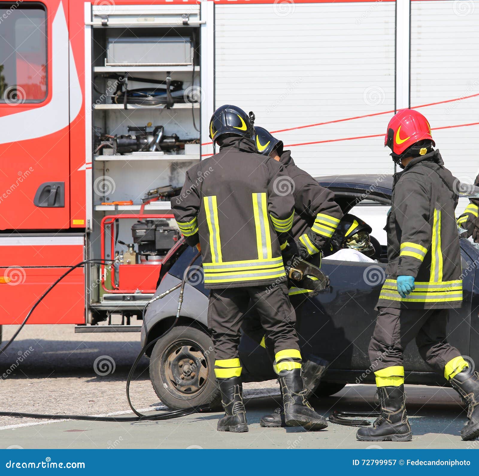 Firemen in Action during the Road Accident Stock Image - Image of ...