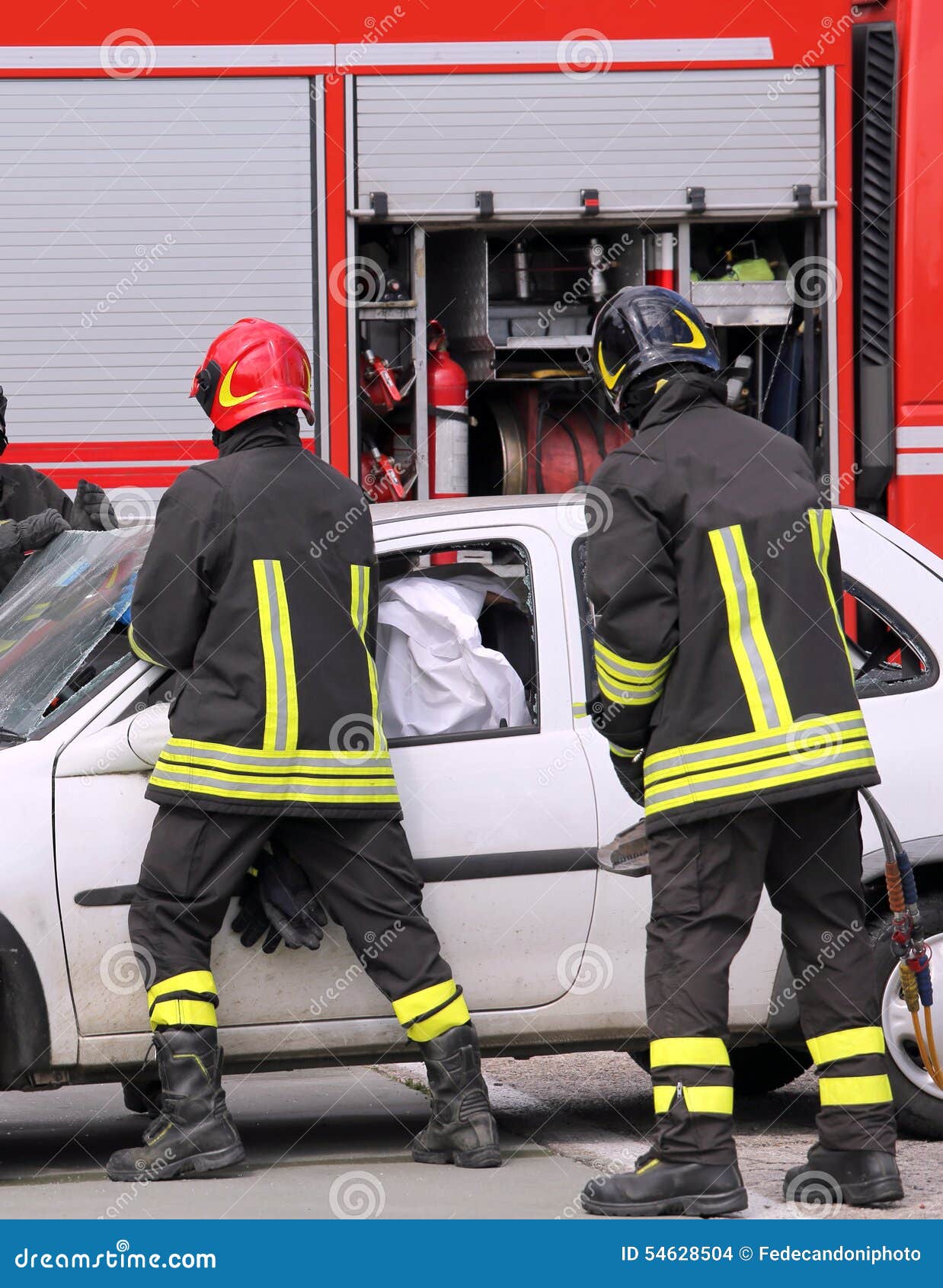 Firemen in Action after the Road Accident Stock Photo - Image of ...