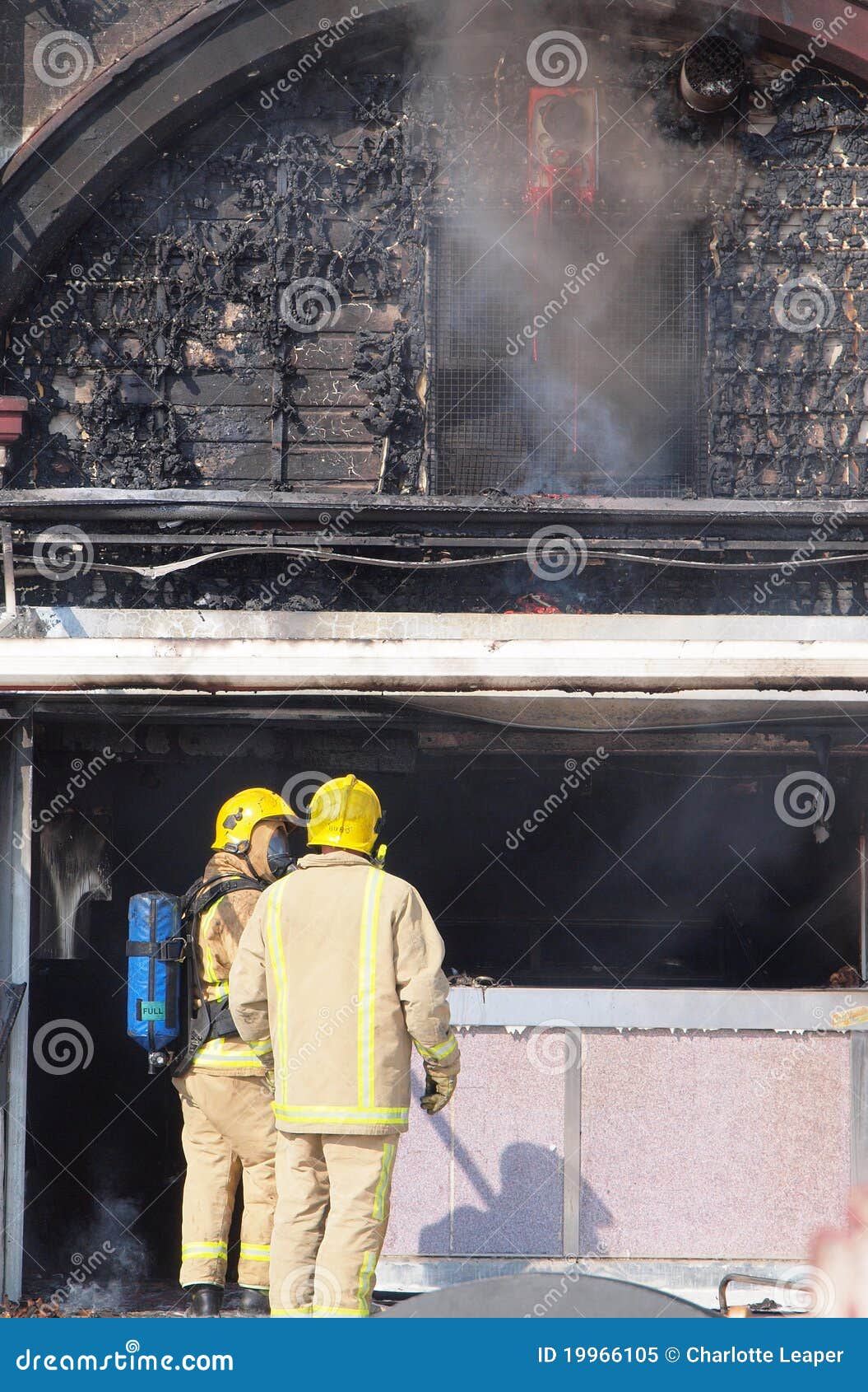 Firemen assessing damage editorial image. Image of firemen - 19966105