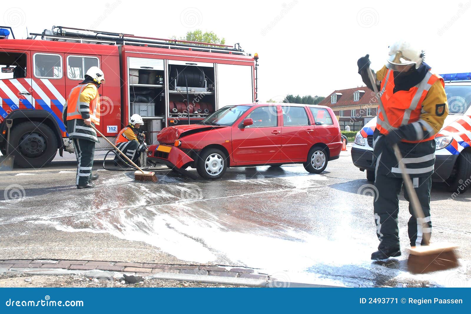 Firemen cleaning stock image. Image of crumple, steel - 2493771