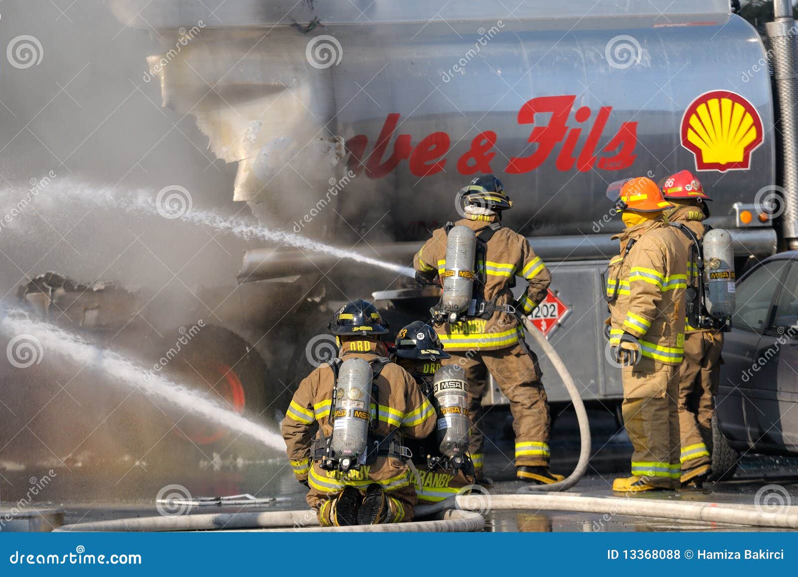 Firemen on duty editorial stock photo. Image of hose - 13368088