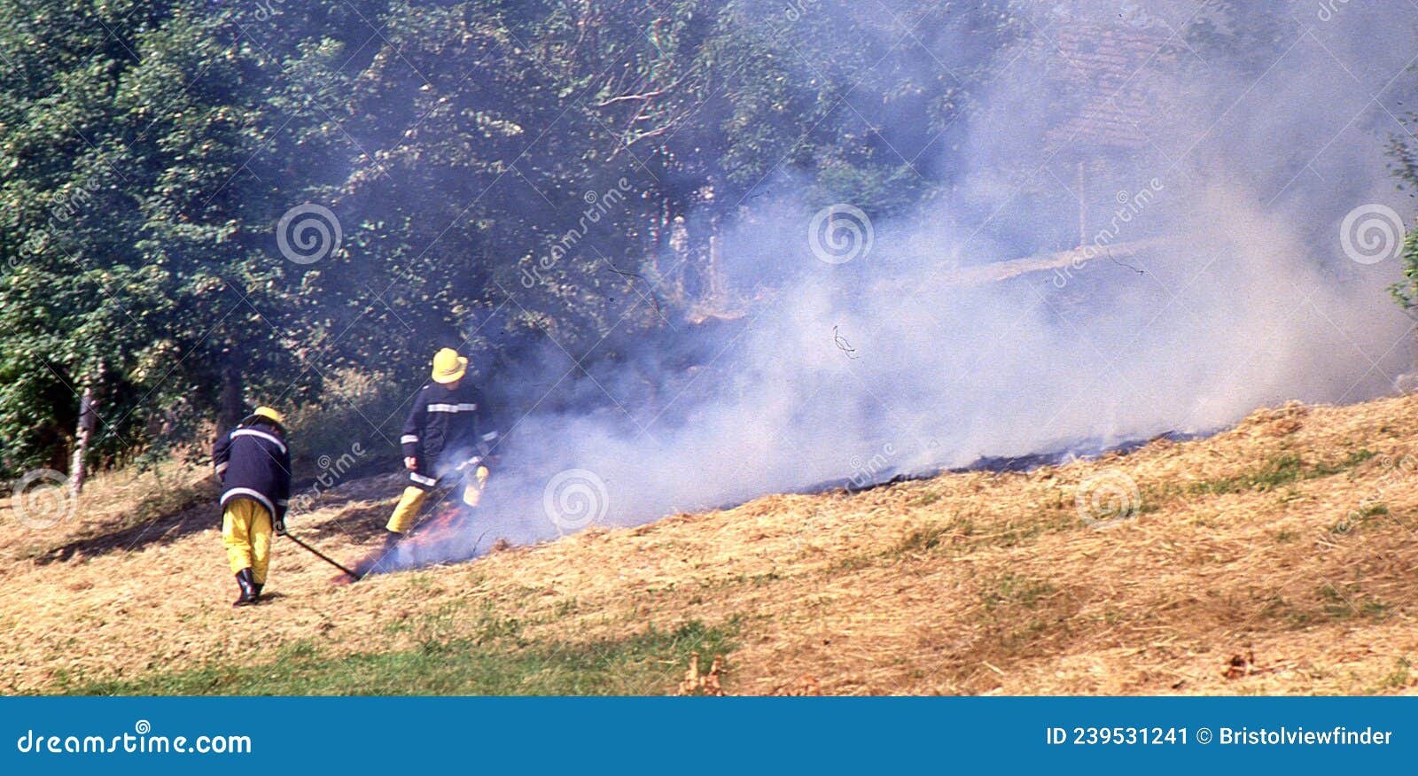 Firemen Fighting a Fire in a Dry Field Editorial Photo - Image of ...