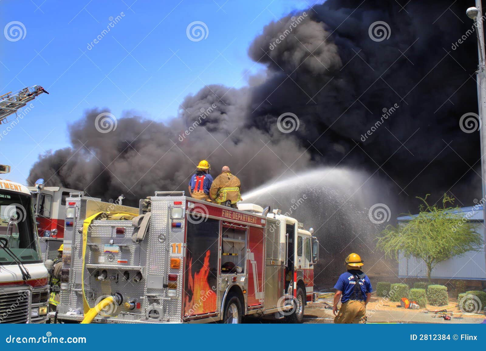 Firemen on a Fire truck stock photo. Image of truck, black - 2812384