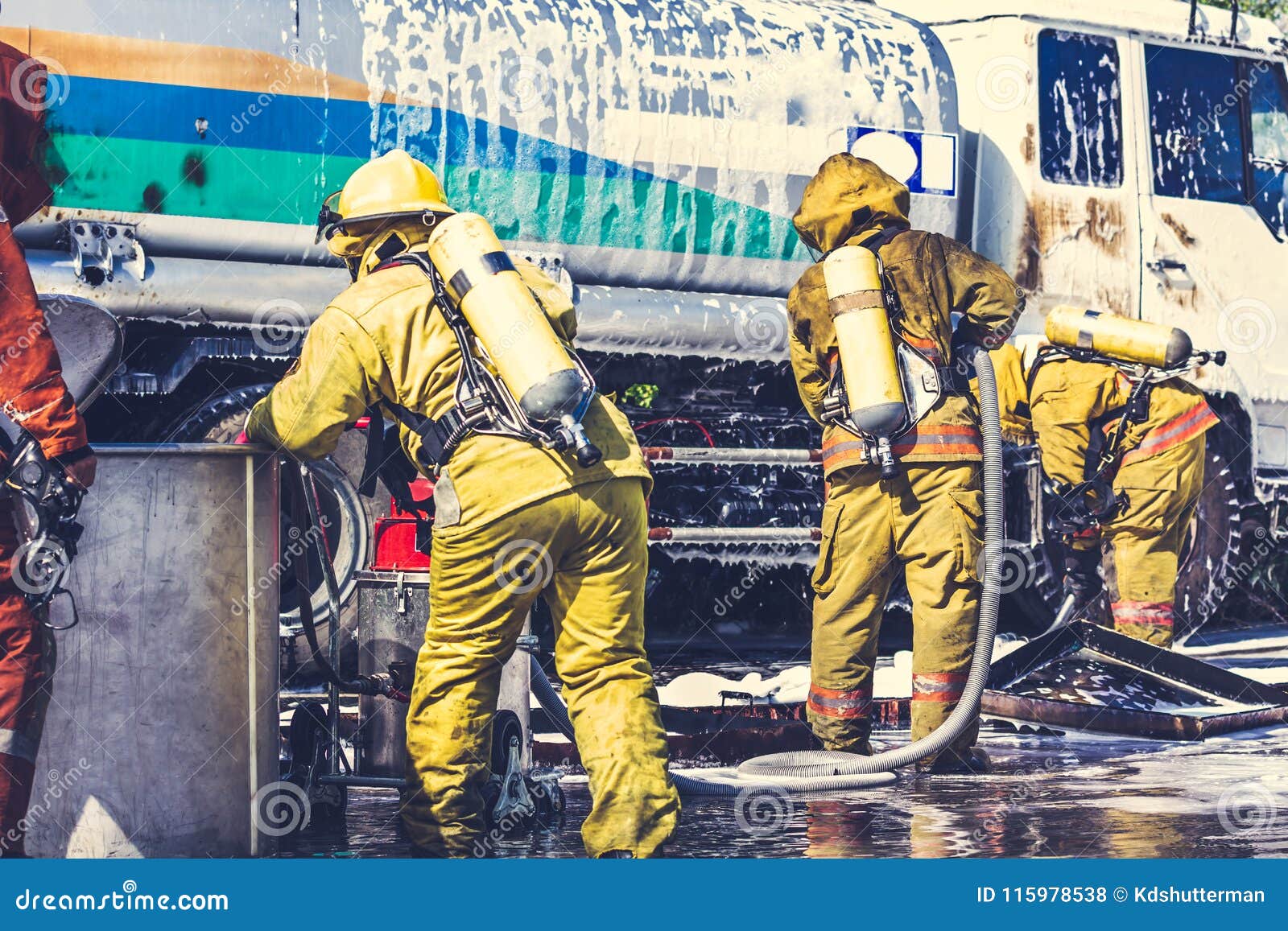 Firemen in Firefighter Uniform are Checking Their Equipment after Use ...