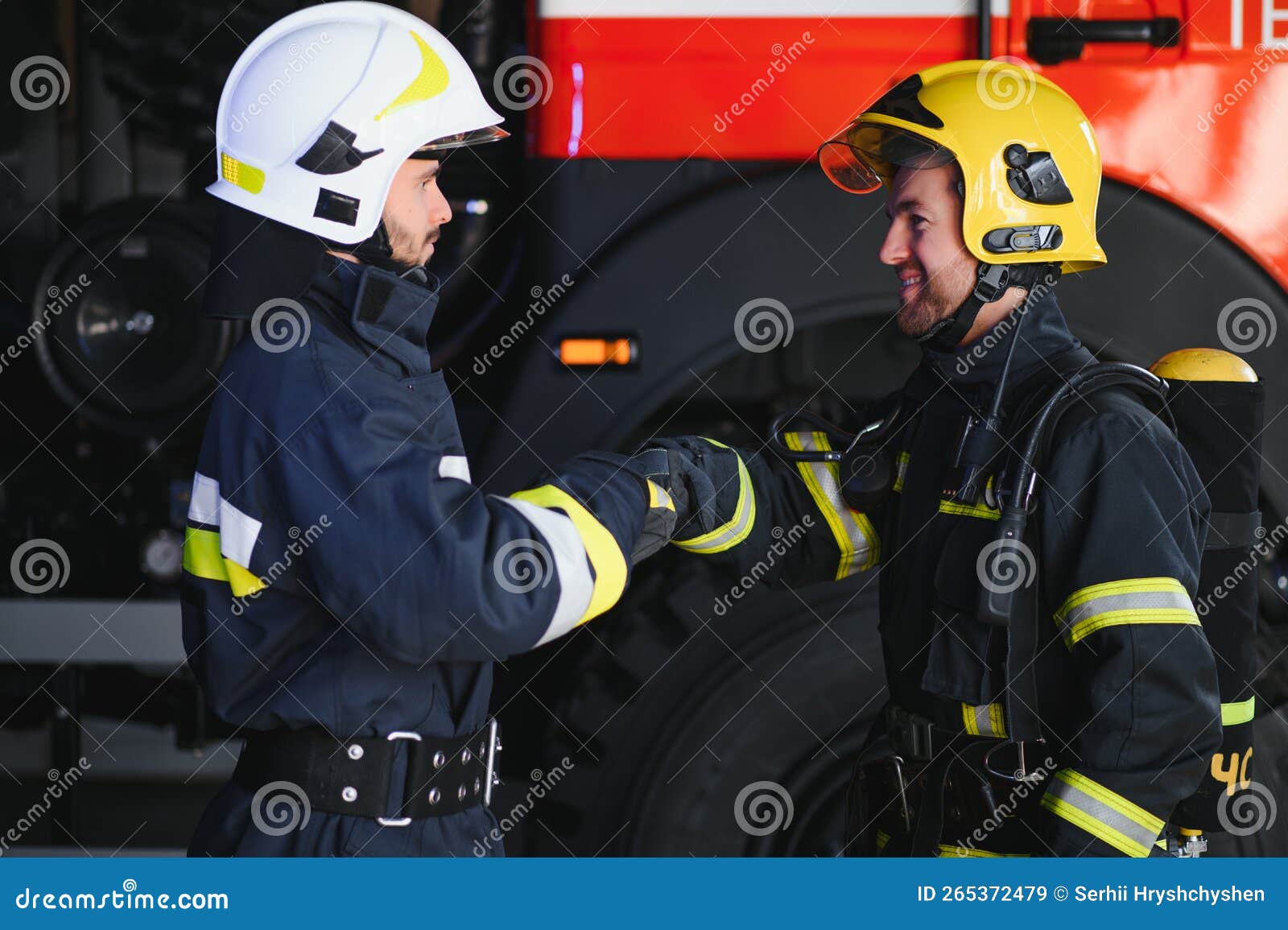 Firemen Leaving the Station Equipped and with the Tools for the ...
