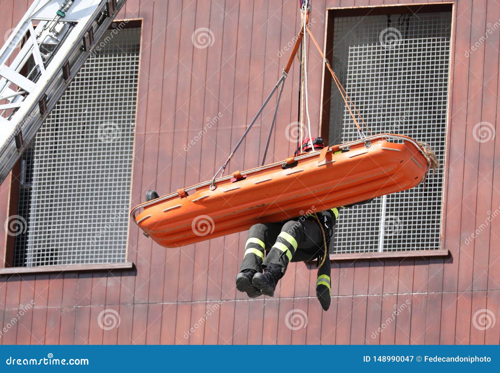 Firemen during a Rescue with Stretcher Stock Image - Image of barrow ...