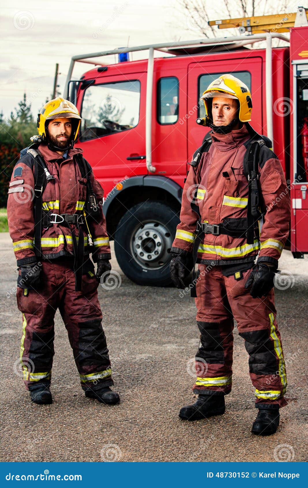 Firemen Standing Next To Fire Truck. Stock Photo - Image of confidence ...