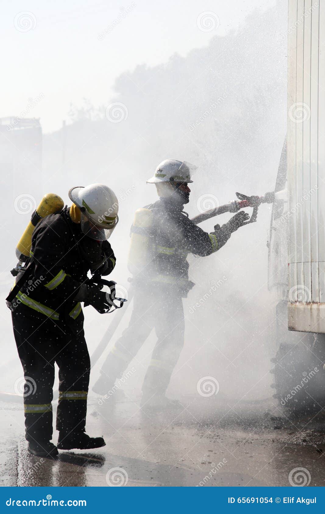 Firemen editorial stock image. Image of safety, yellow - 65691054