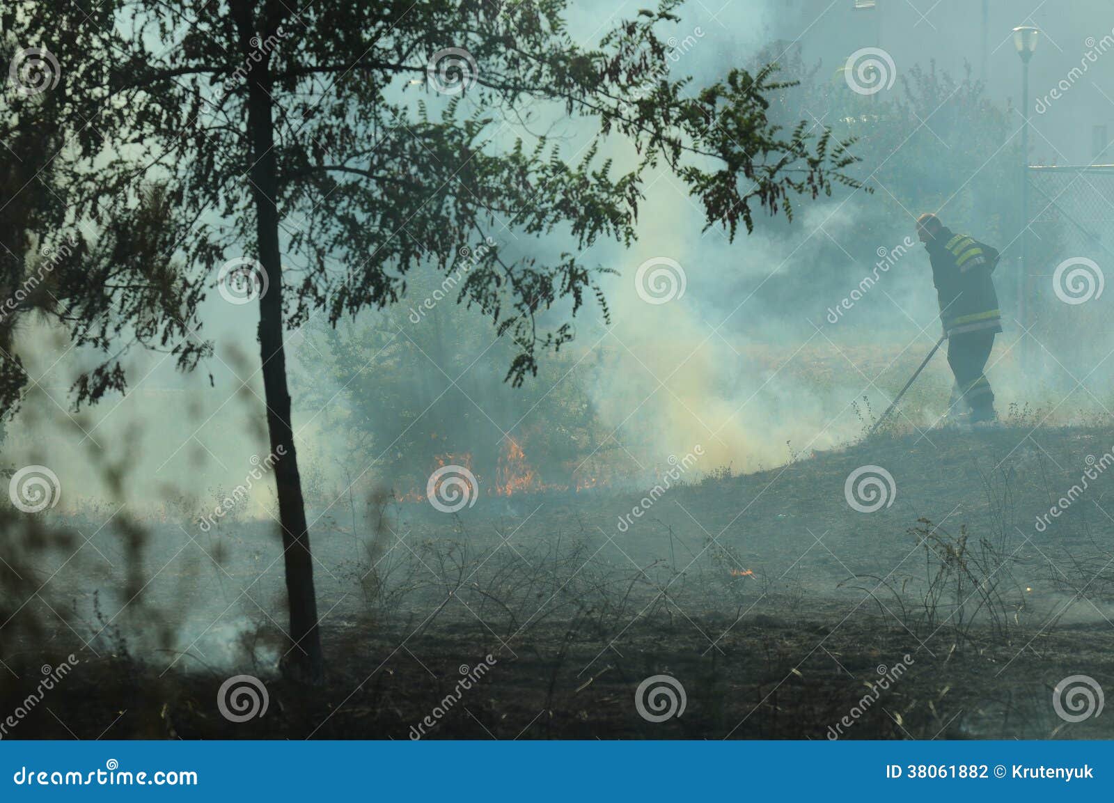 Firemen at Work Trying To Control Fire at Burning Field Editorial ...