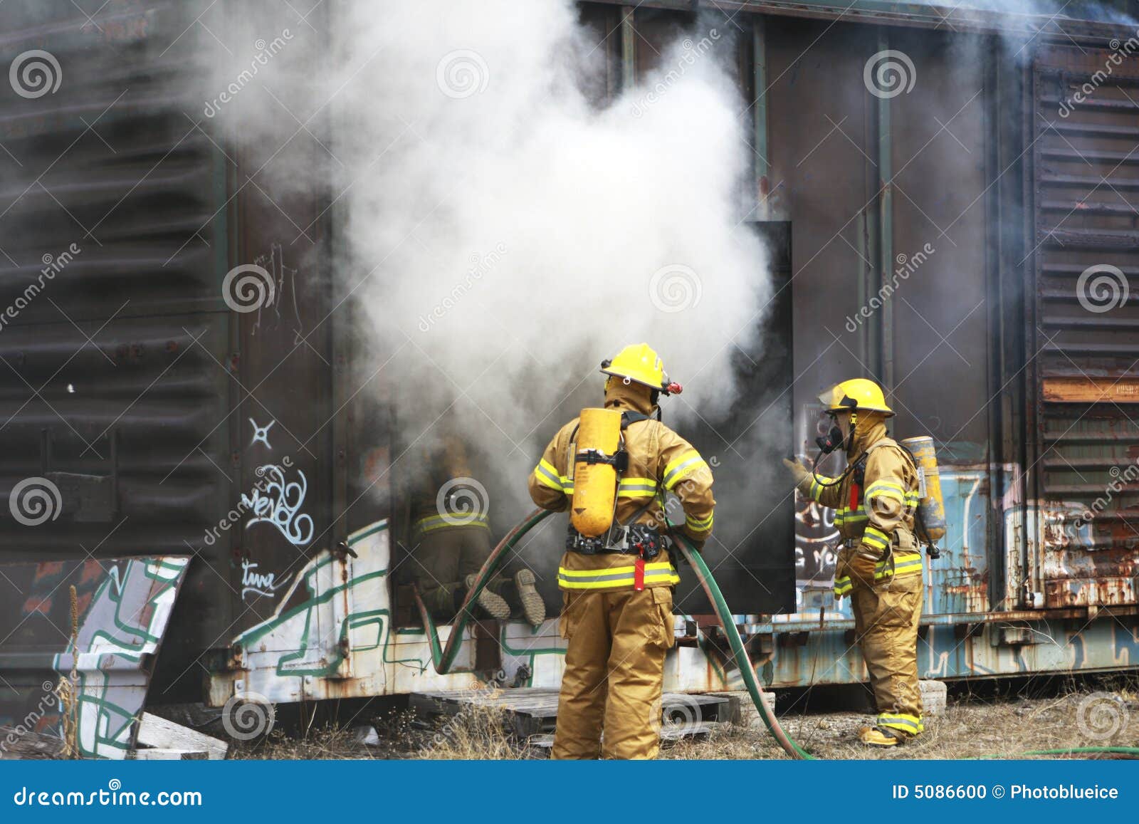 Firemen Working To Put Out Fire Stock Photo - Image of heat, rescue ...
