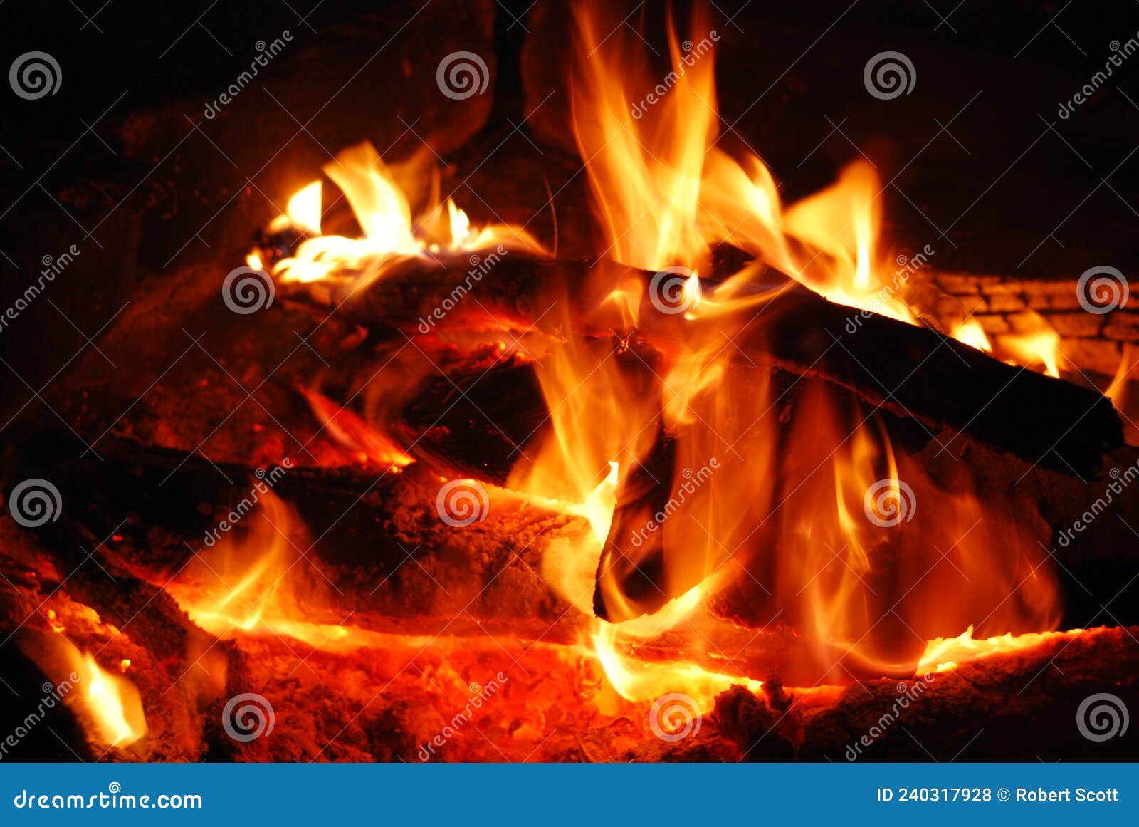 The Soft Glow of the Fire stock photo. Image of flame - 240317928