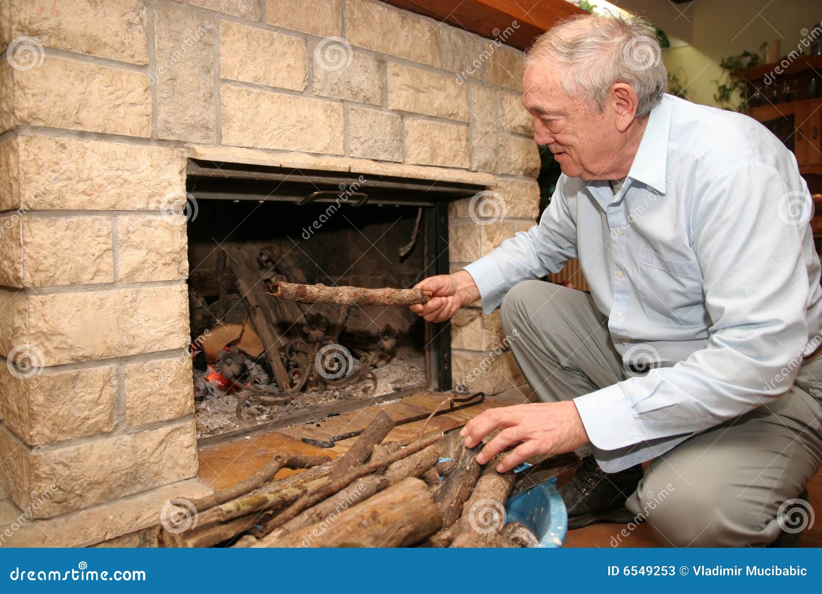 Fireplace stock image. Image of leisure, light, room, person - 6549253
