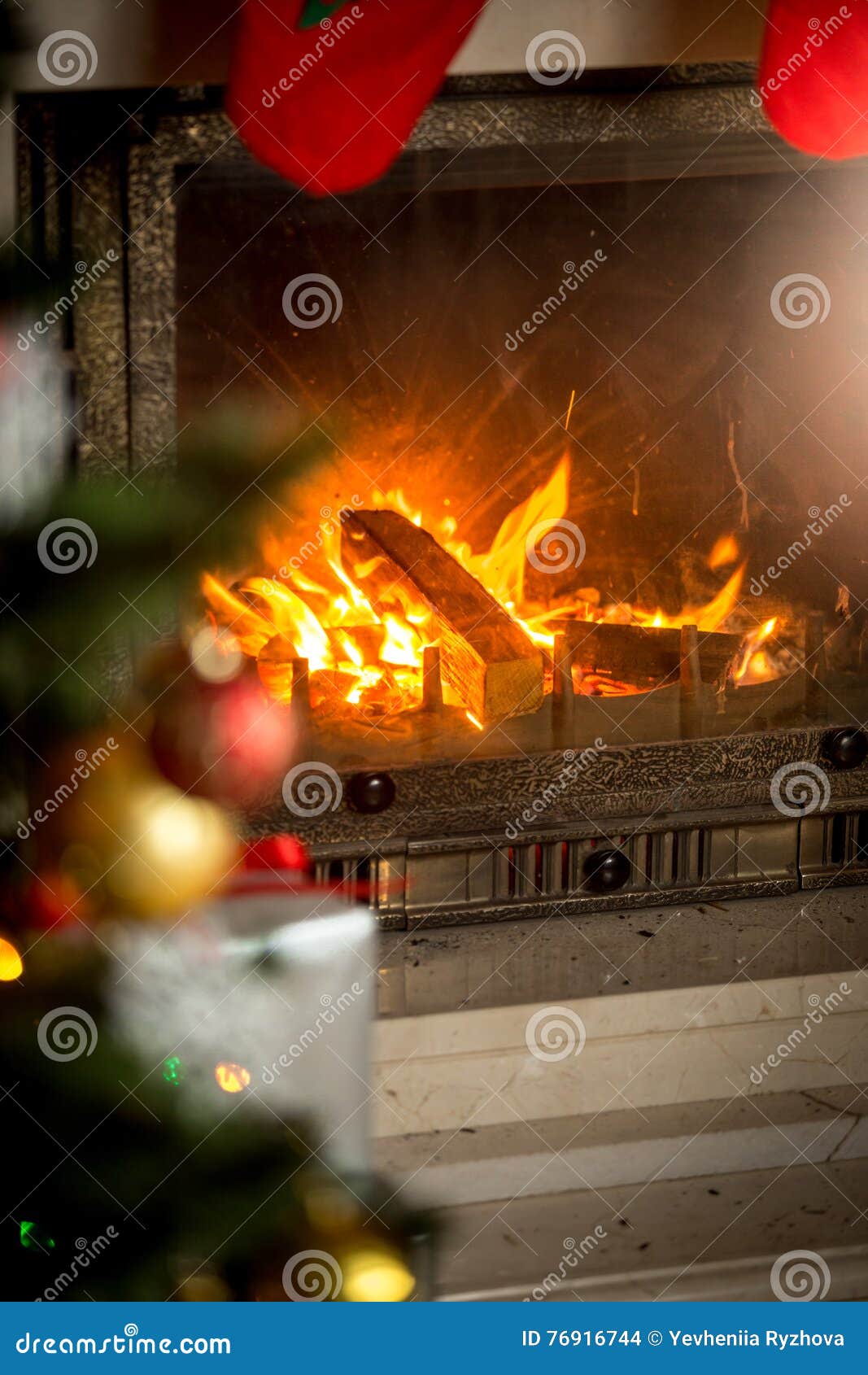 Fireplace with with Burning Wood Logs Decorated for Christmas Stock ...