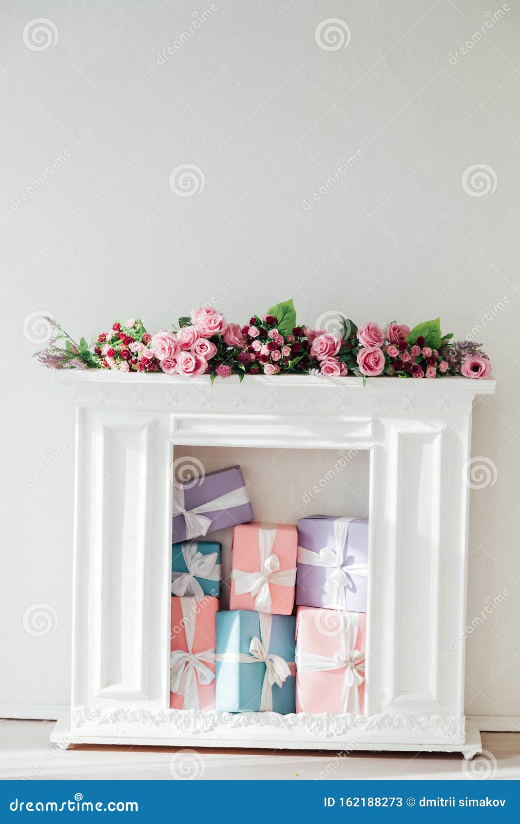 Fireplace with Flowers in the Interior of the White Room Stock Image ...