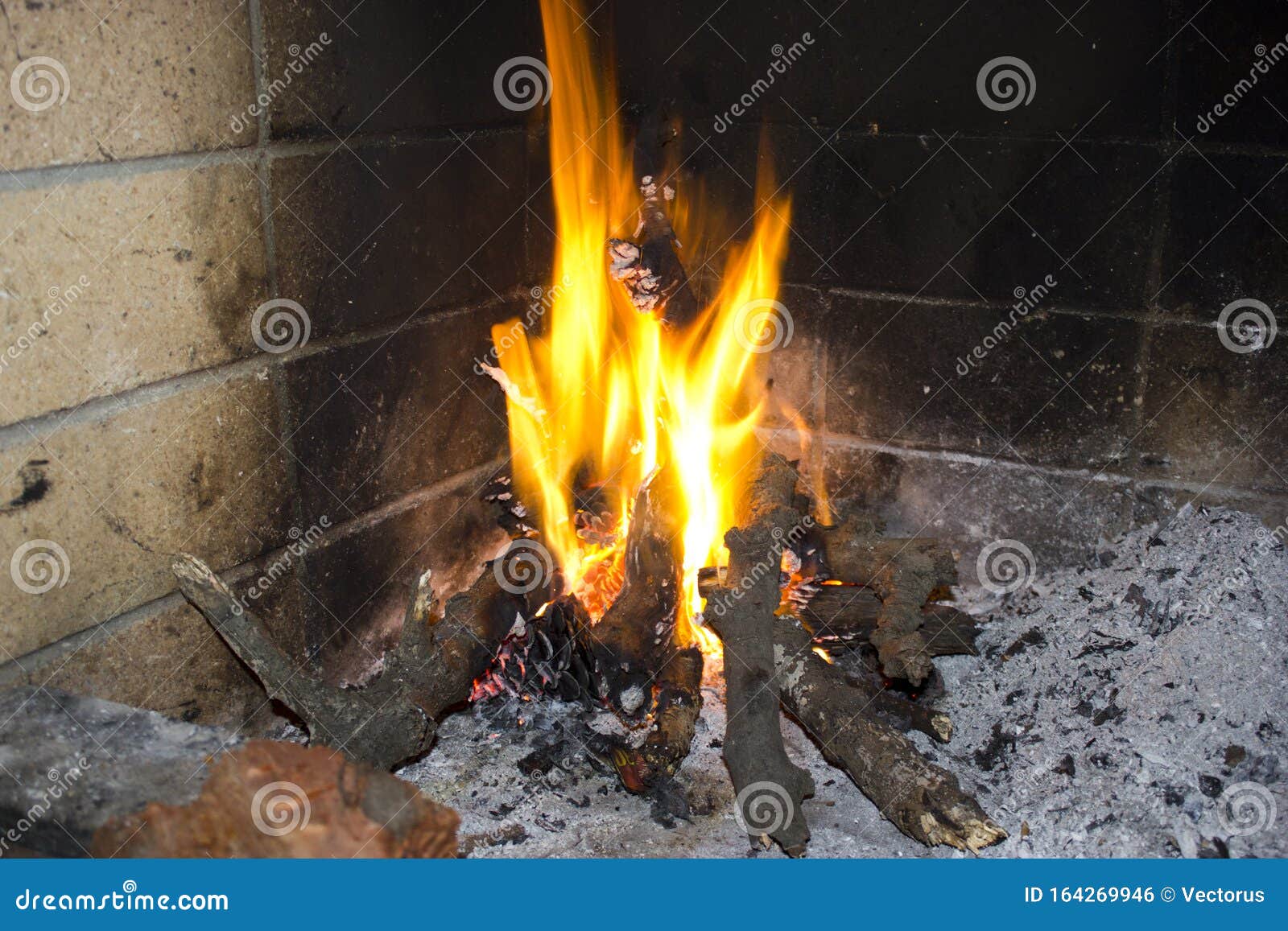 Fireplace with Long Flames on Timbers Stock Photo - Image of timbers ...