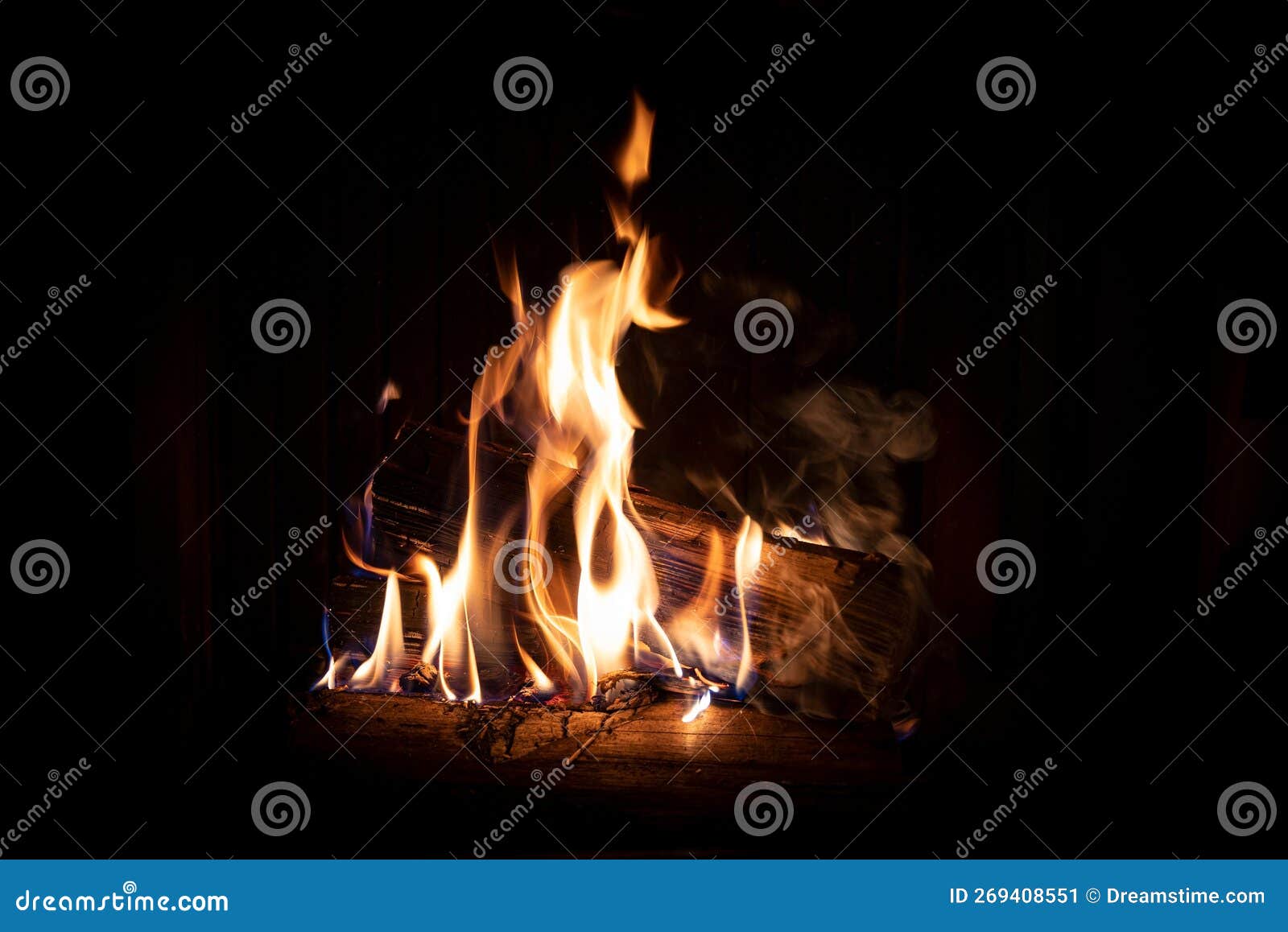 Fireplace with Several Lit Pieces of Fire Stock Image - Image of ...