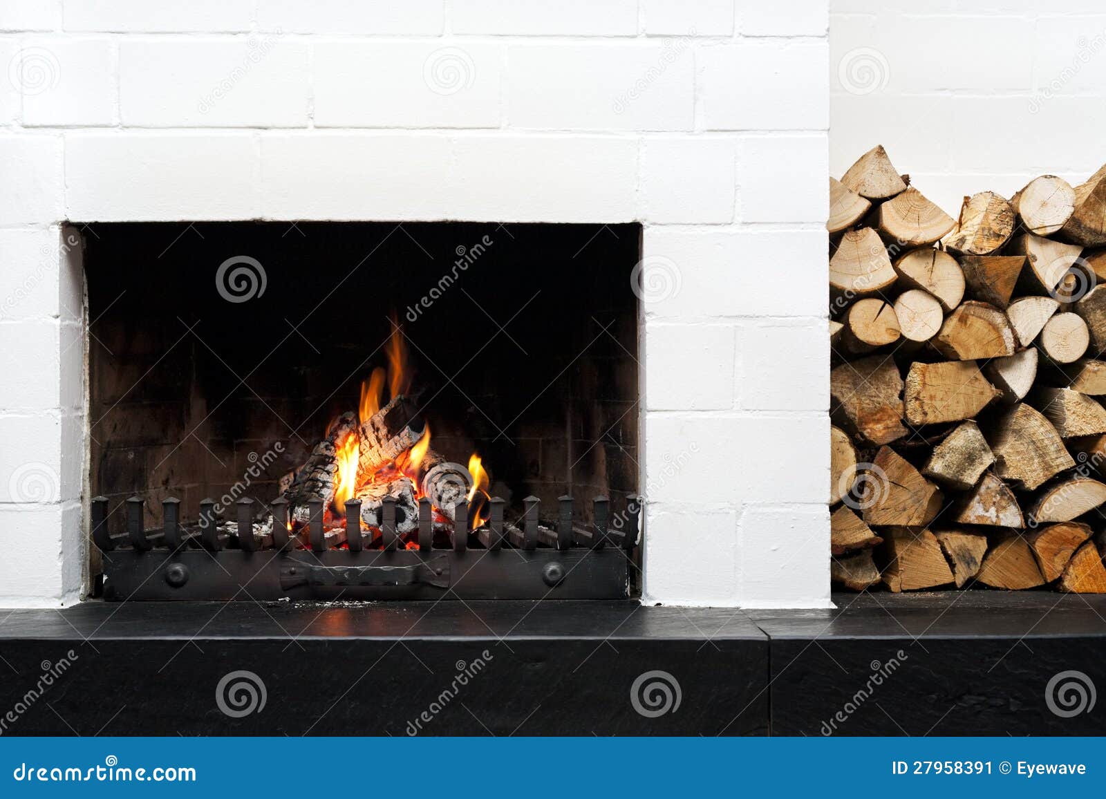 Fireplace and stacked wood stock image. Image of comfort - 27958391