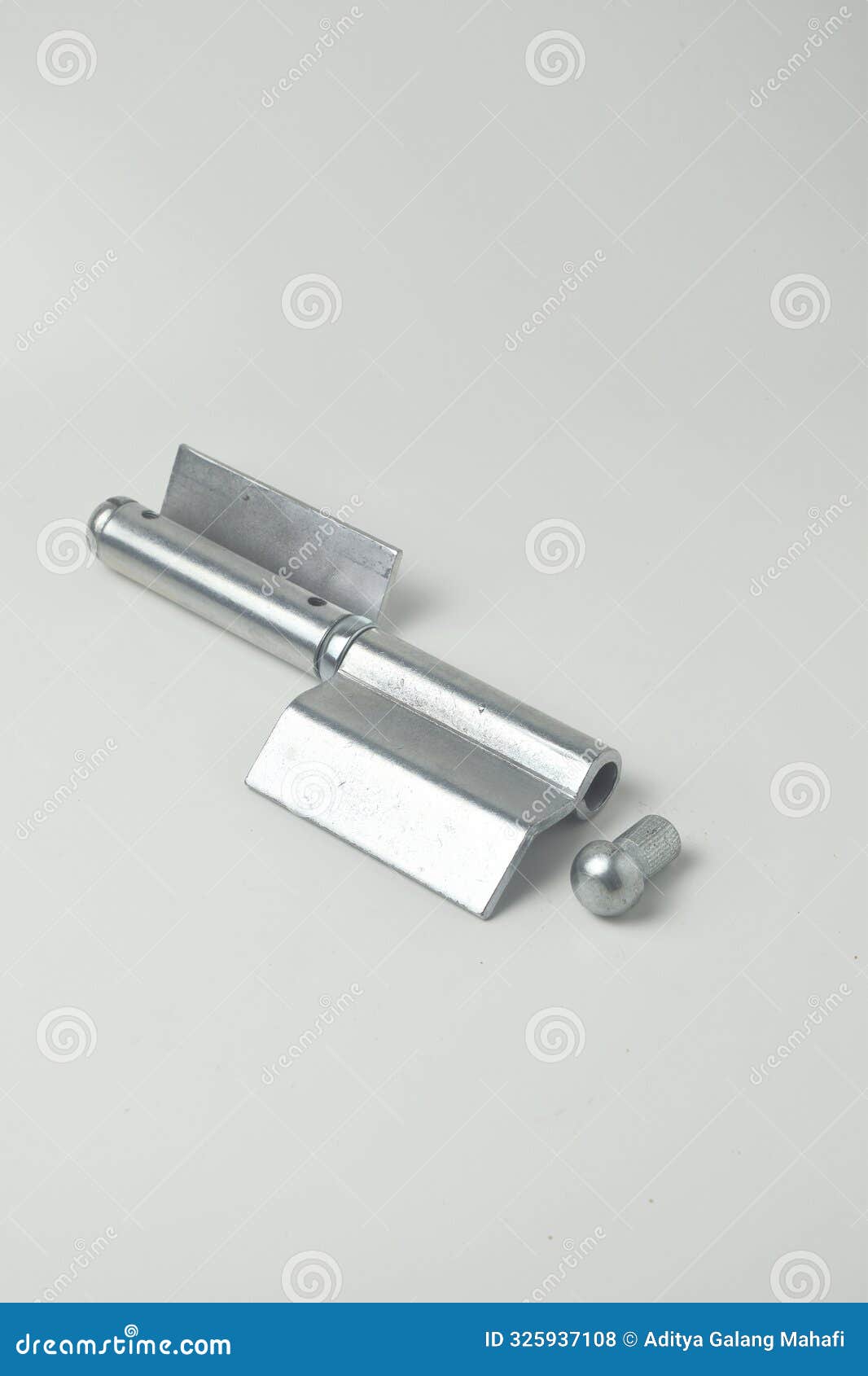 A Fireproof Iron Hinge Made in Indonesia with a White Background Stock ...