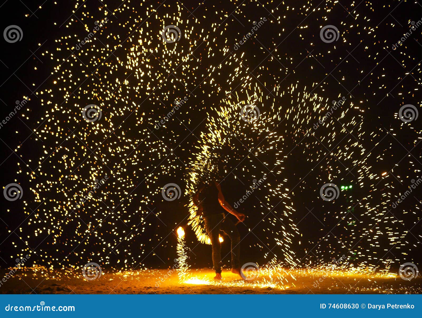 Amazing Fire Show Dance. Fire Dancers In Beautiful Costumes Playing ...