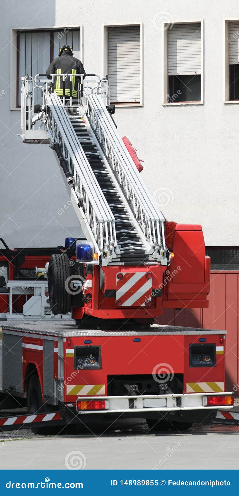 Firetruck and the Big Ladder Stock Image - Image of condominium ...