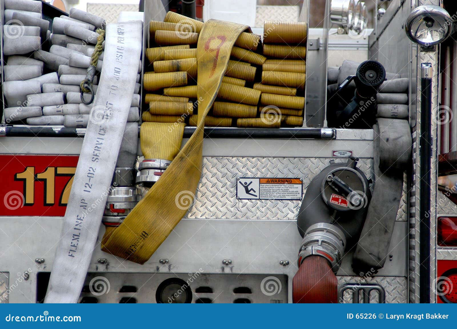 Firetruck and hose stock photo. Image of insurance, uniform - 65226