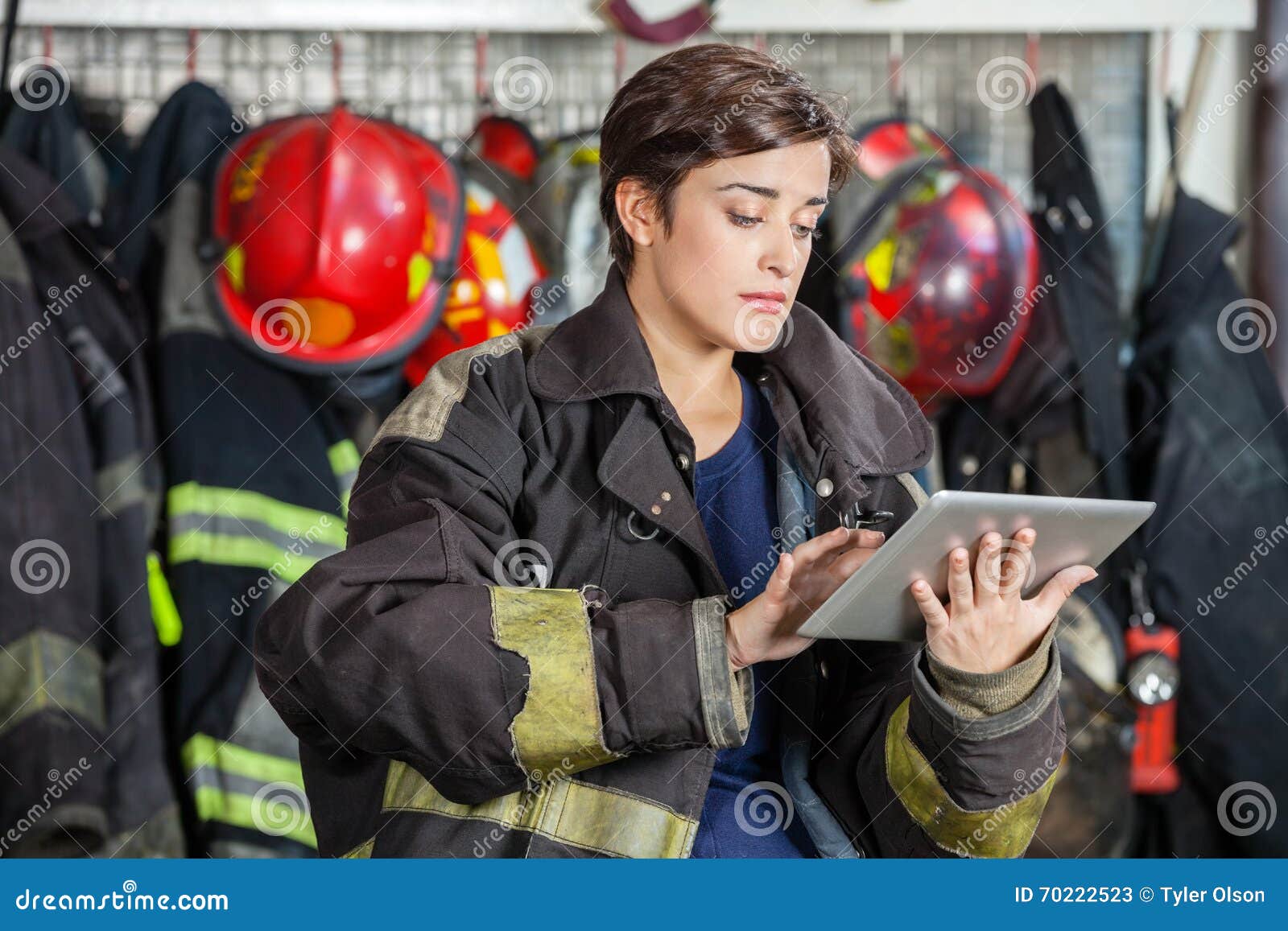 Firewoman Using Digital Tablet at Fire Station Stock Image - Image of ...