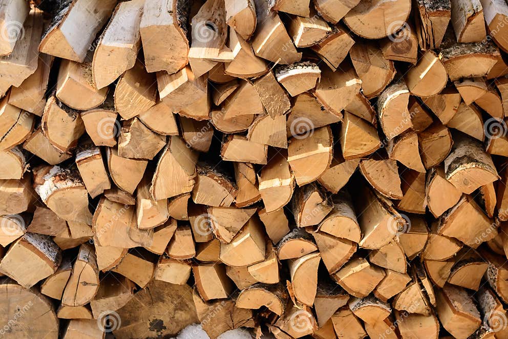 Firewood Background - Split Hardwood Kiln-dried. Split Firewood in the ...
