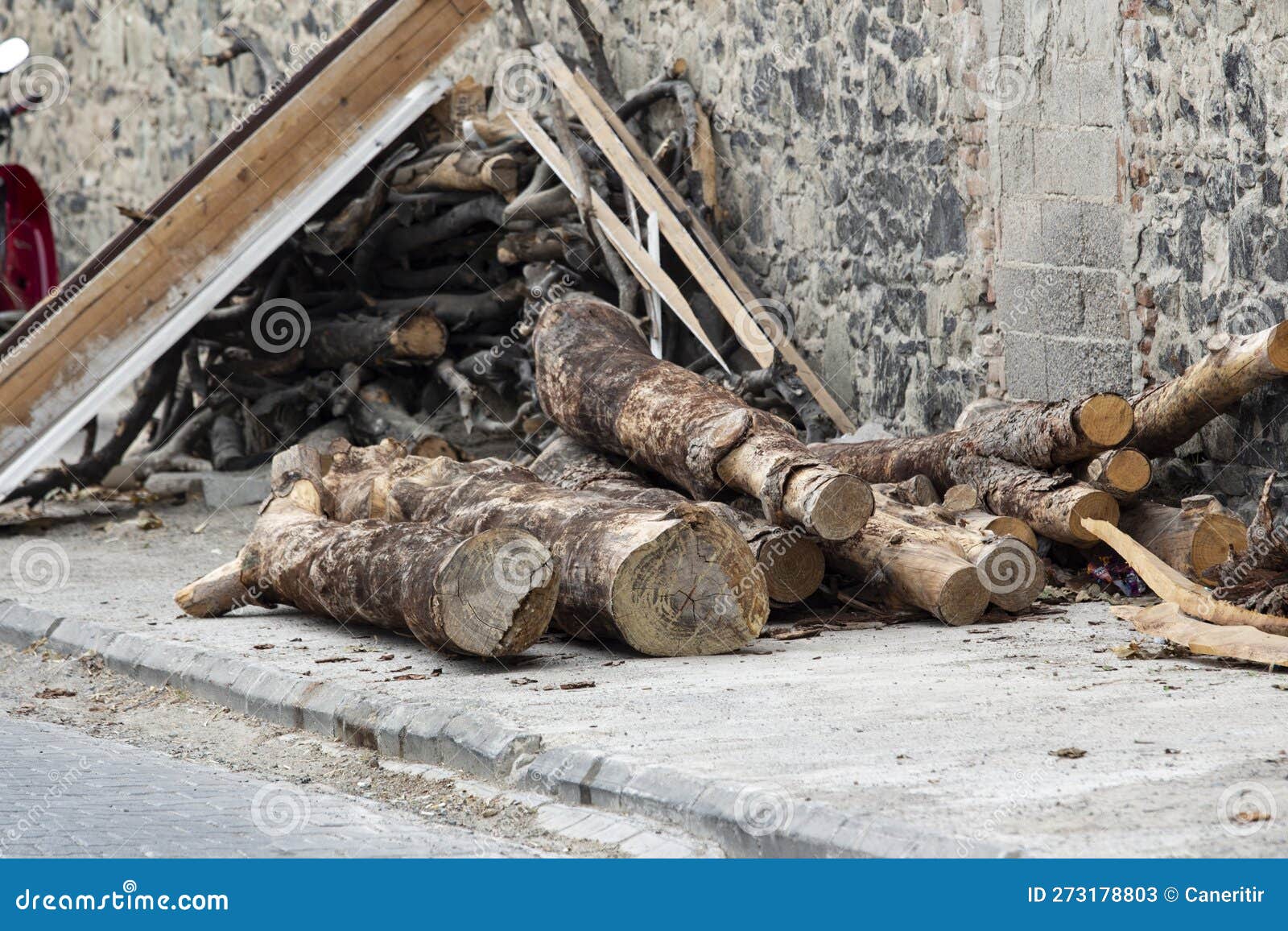 Firewood is Stacked in Front of a House in a Rural Area. Pile of ...
