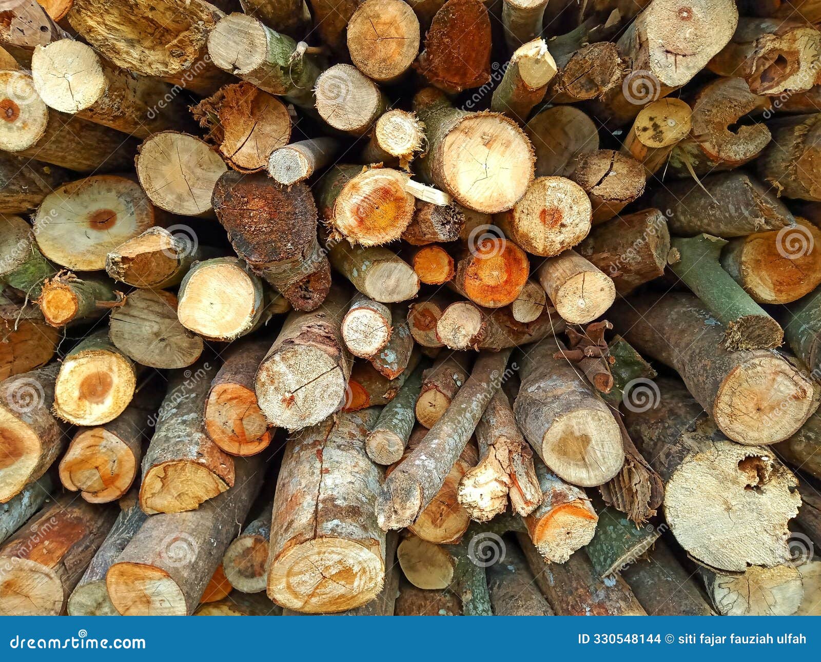 Firewood Stacked Up On Some Slab Boards Stock Photography ...