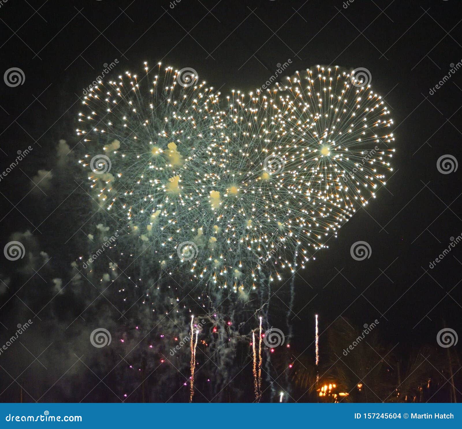 Firework Bursts in Heart Shape Against Night Sky. Stock Photo - Image ...