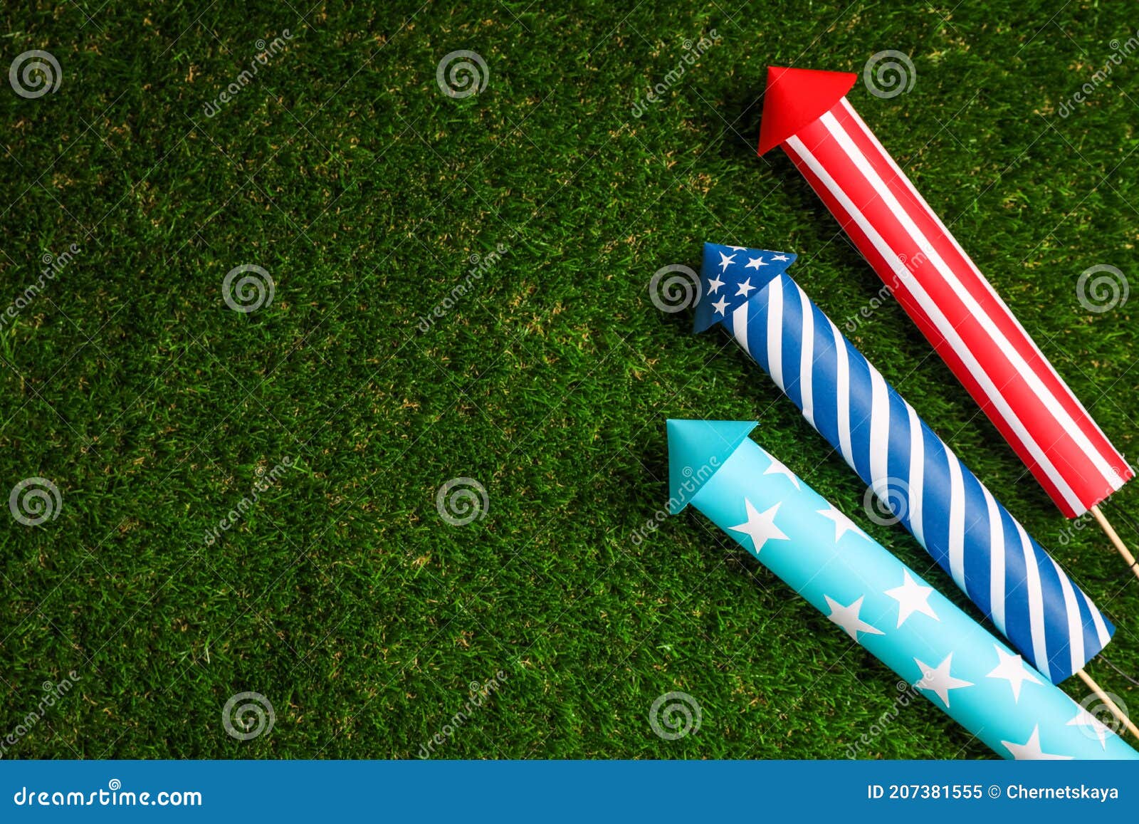 Firework Rockets on Green Grass, Flat Lay. Space for Text Stock Image ...