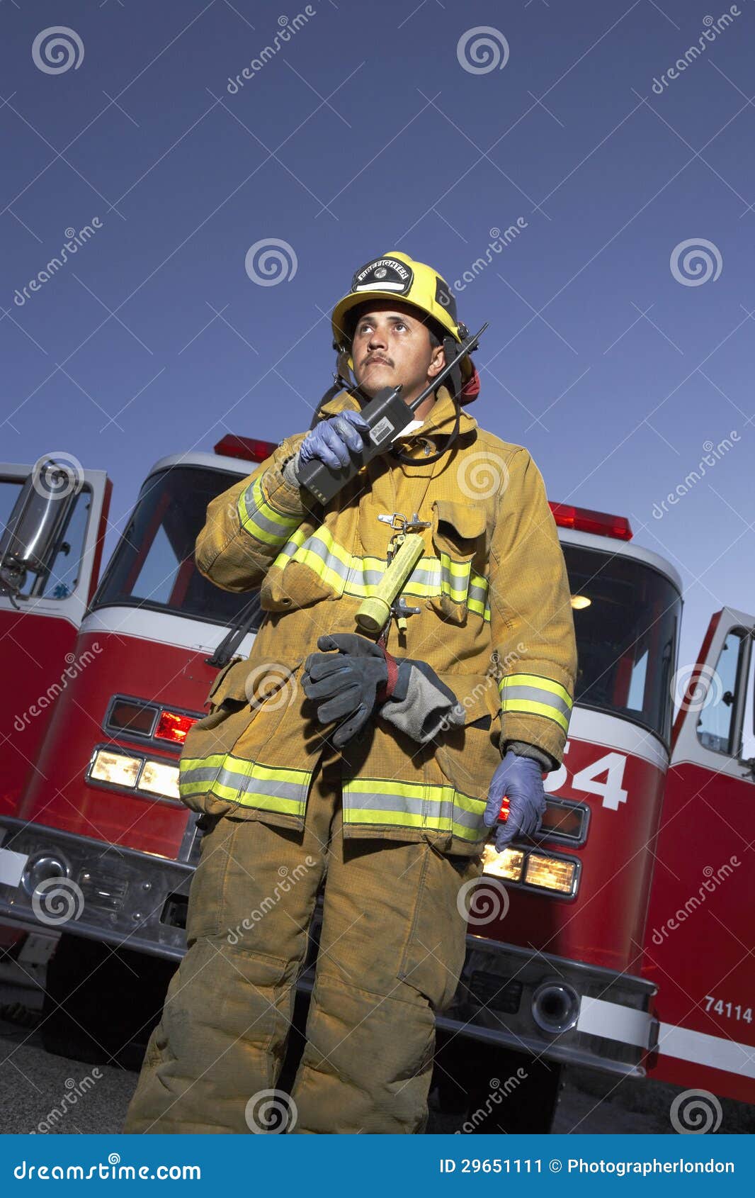 Fireworker Talking on Walkie Talkie Stock Image - Image of professional ...