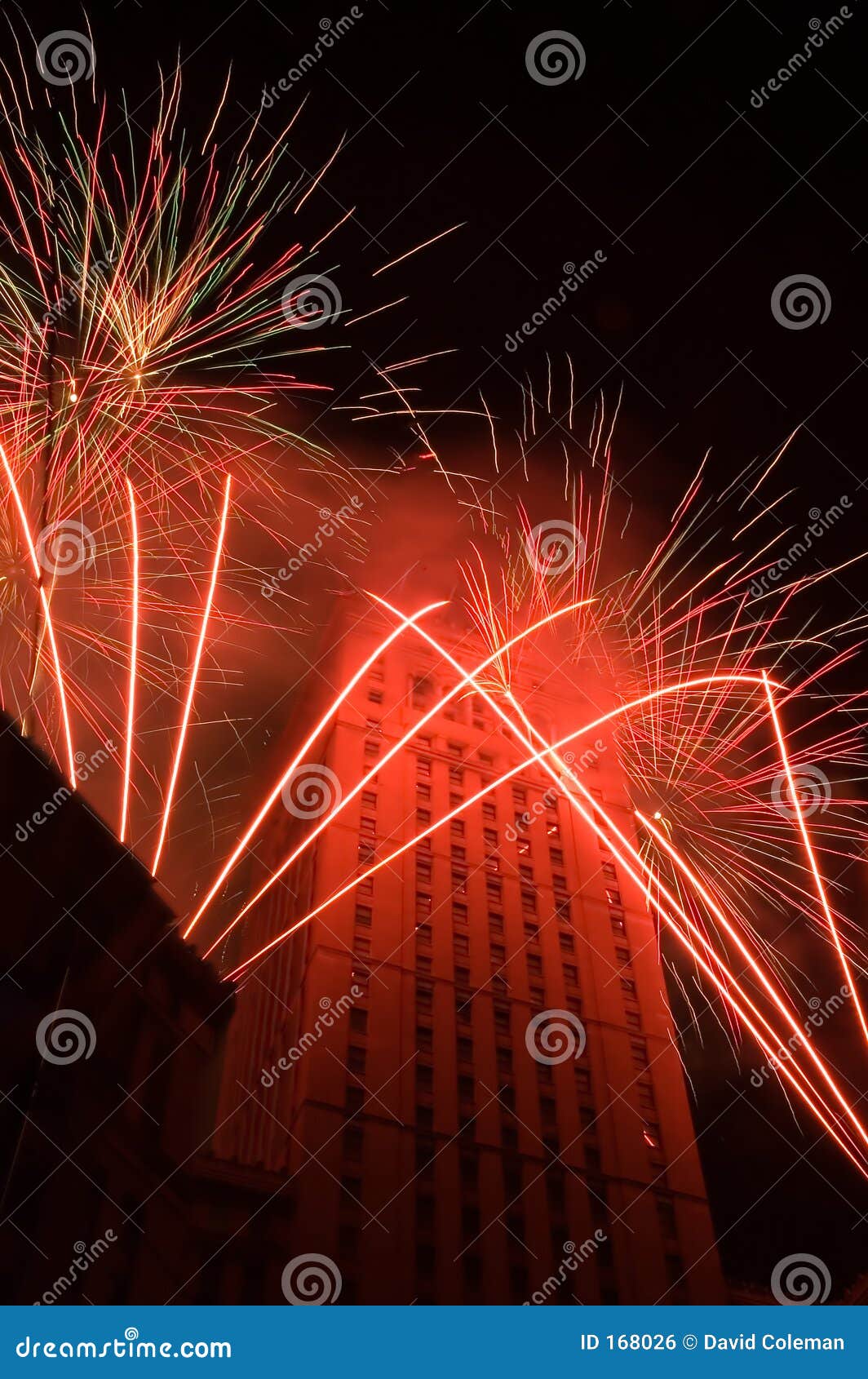 Fireworks Around a Tall Building Stock Photo - Image of white ...