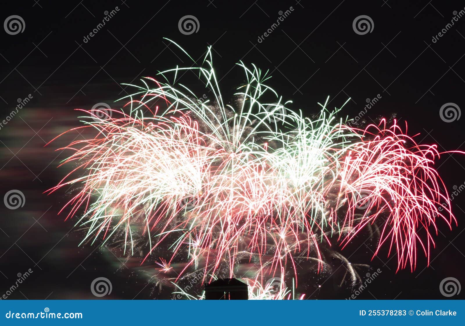 A Glowing Maze of Fireworks with Colours Reflecting Off the Smoke and ...