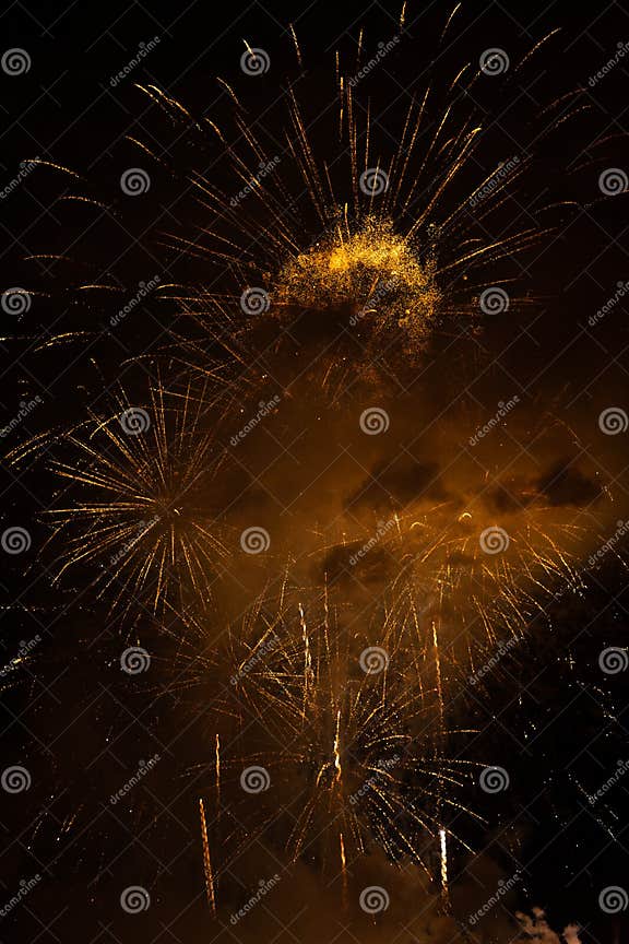 Fireworks Exploding Behind a Wall of Smoke Stock Photo - Image of ...
