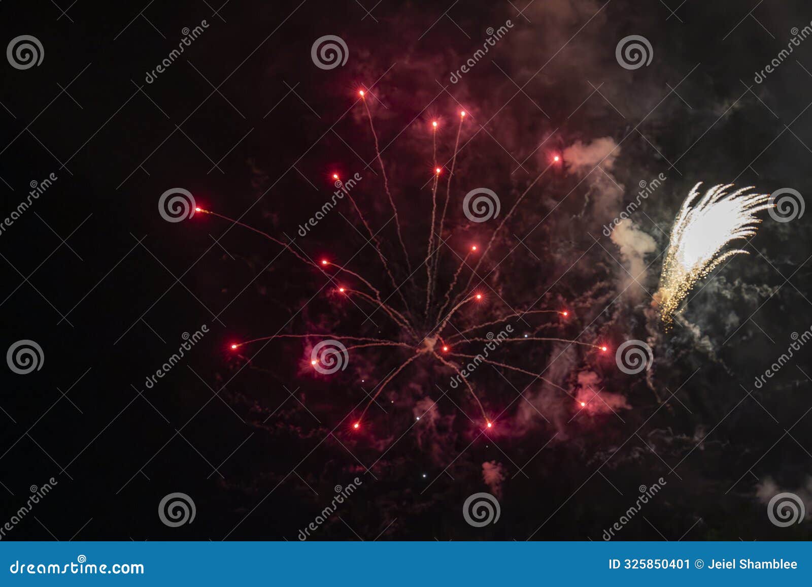 Fireworks Exploding in the Smoky Night Sky Stock Image - Image of ...